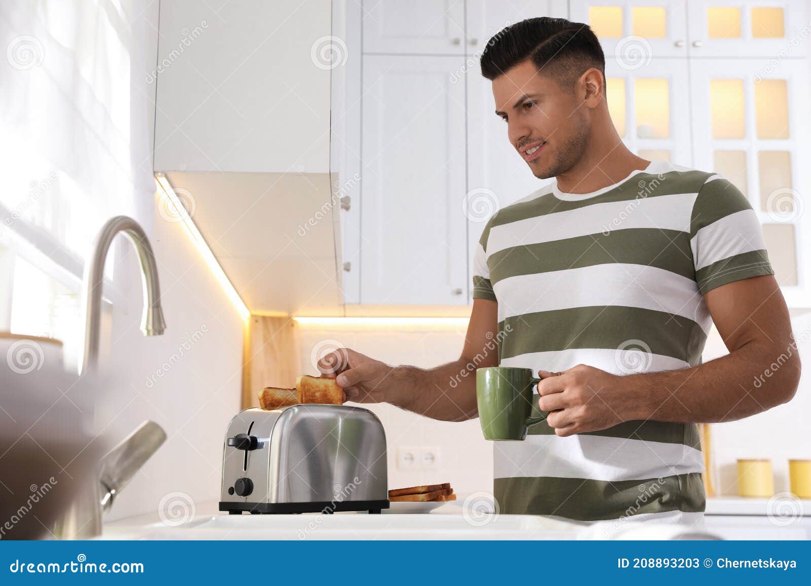 Man Using Modern Toaster at Kitchen Counter Stock Image - Image of ...