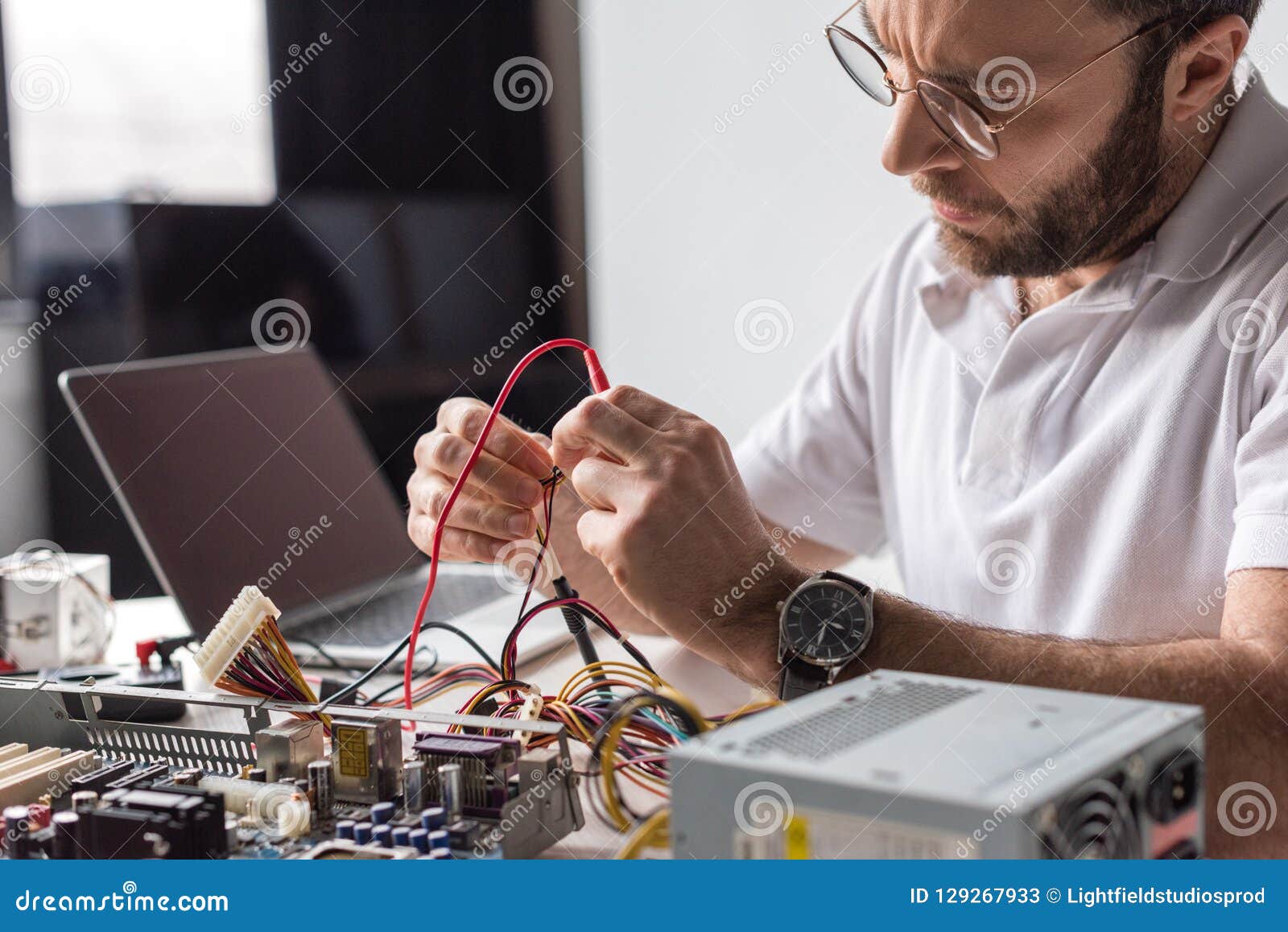 Man Using Multimeter while Fixing Broken Computer Stock Image - Image ...