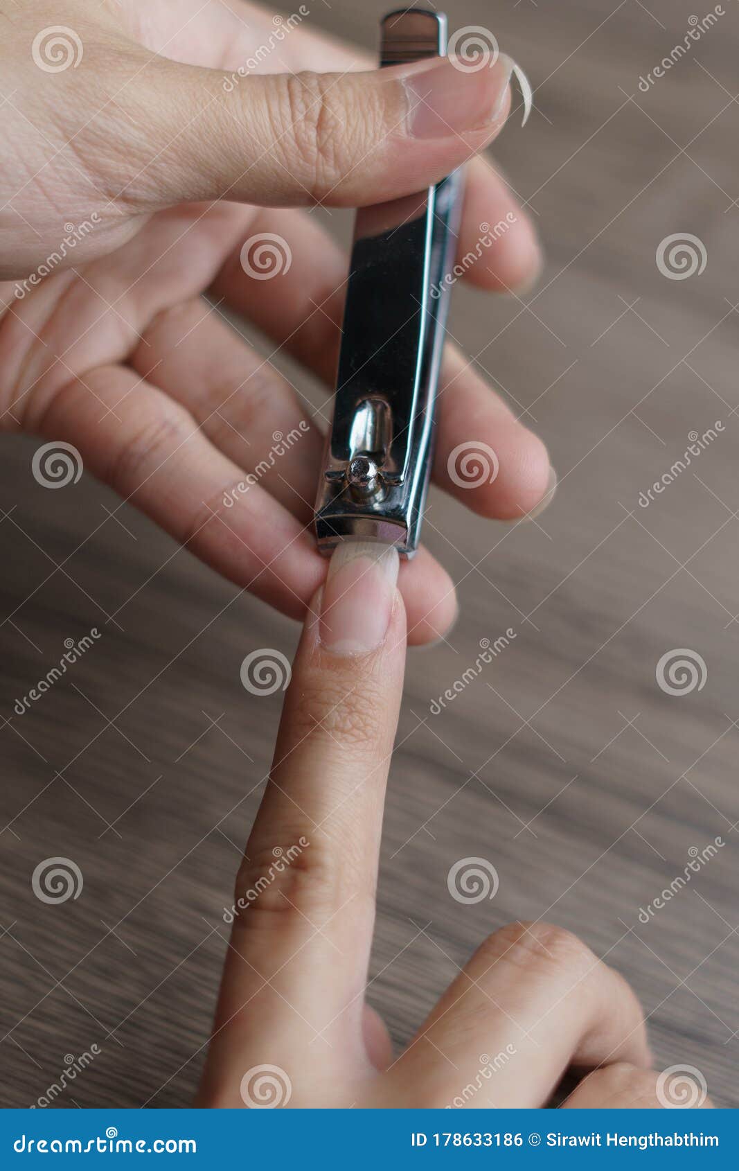 Man Using Nail Clipper Clipping Her Fingernails Stock Photo - Image of ...