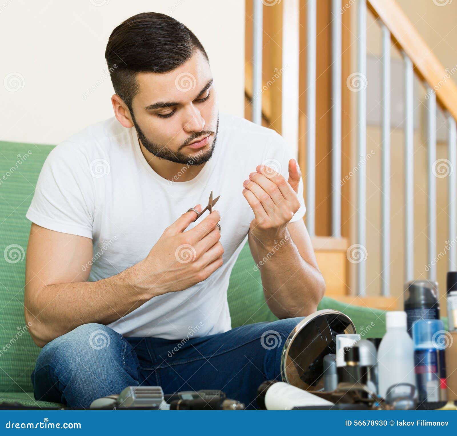 Man using nail file stock photo. Image of cuticle, mirror - 56678930