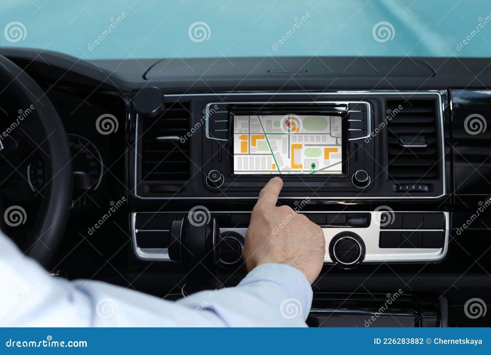 Man Using Navigation System while Driving Car Stock Photo - Image of ...