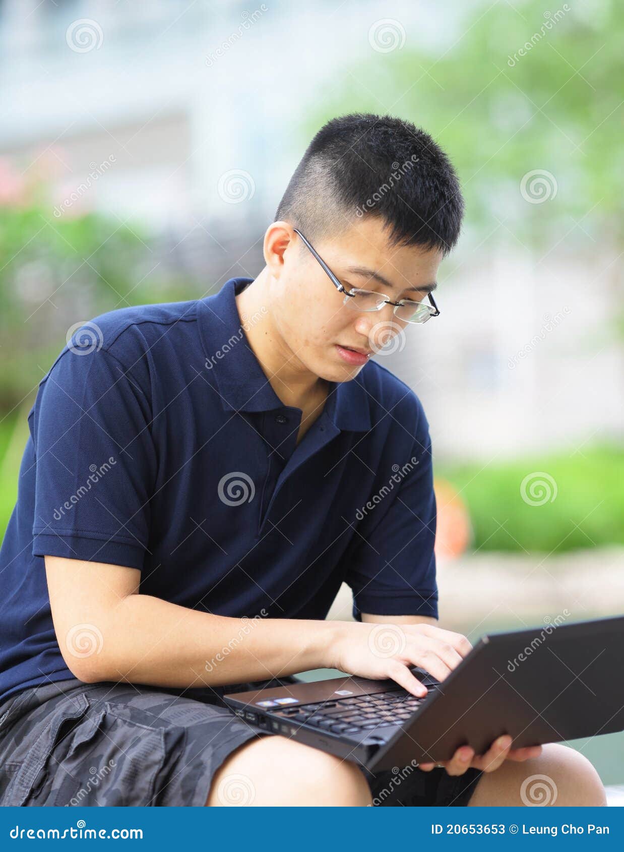 Man Using Notebook Computer Stock Image - Image of modern, grass: 20653653