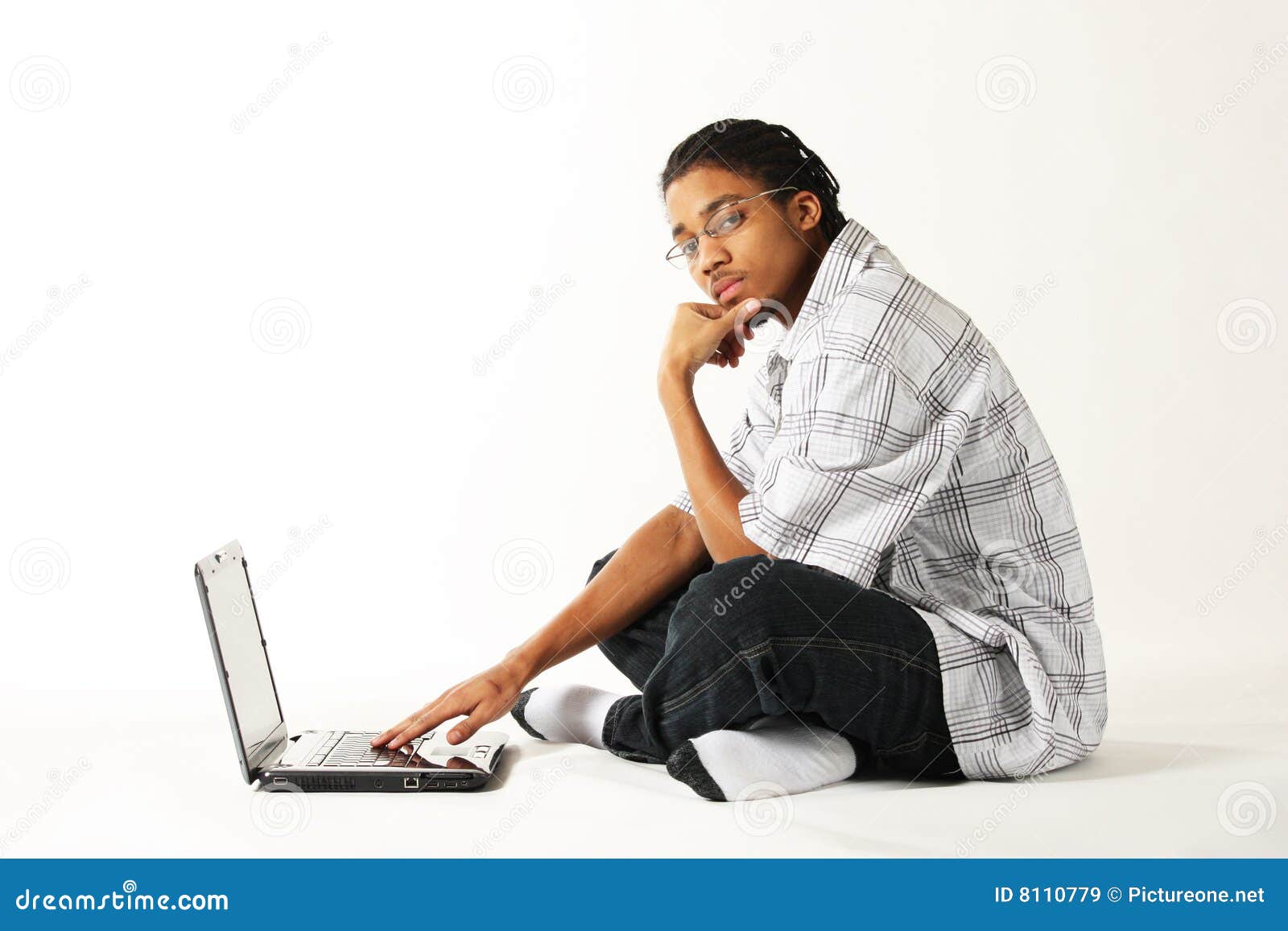 Man Using a Notebook Computer Stock Image - Image of sitting, male: 8110779