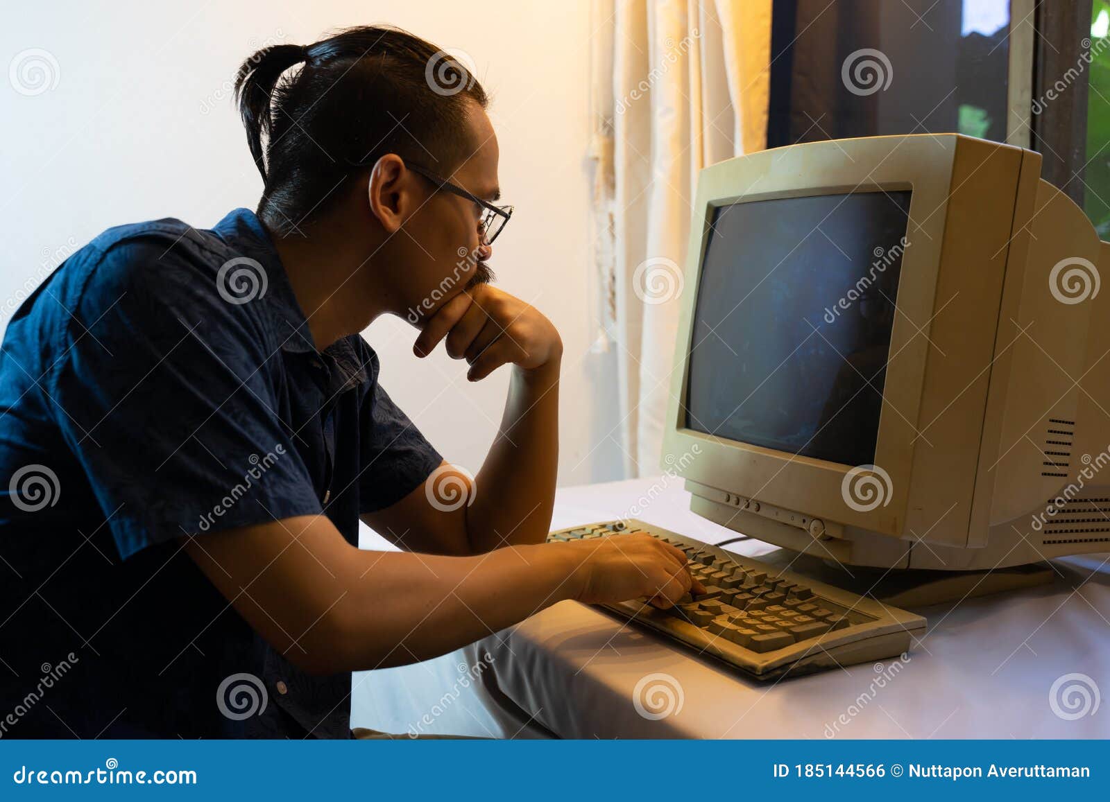 A Man Using an Old Personal Computer . Stock Photo - Image of input ...