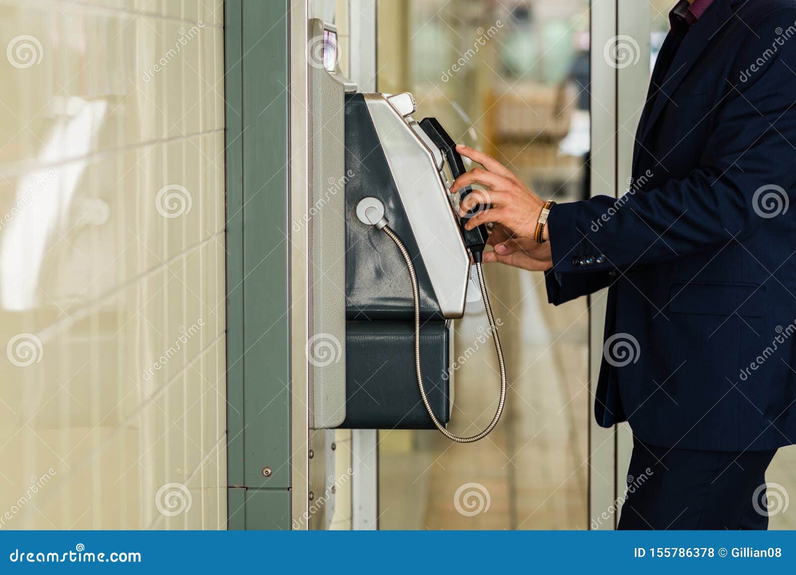 Man Using Payphone at the Train Station Stock Photo - Image of ...