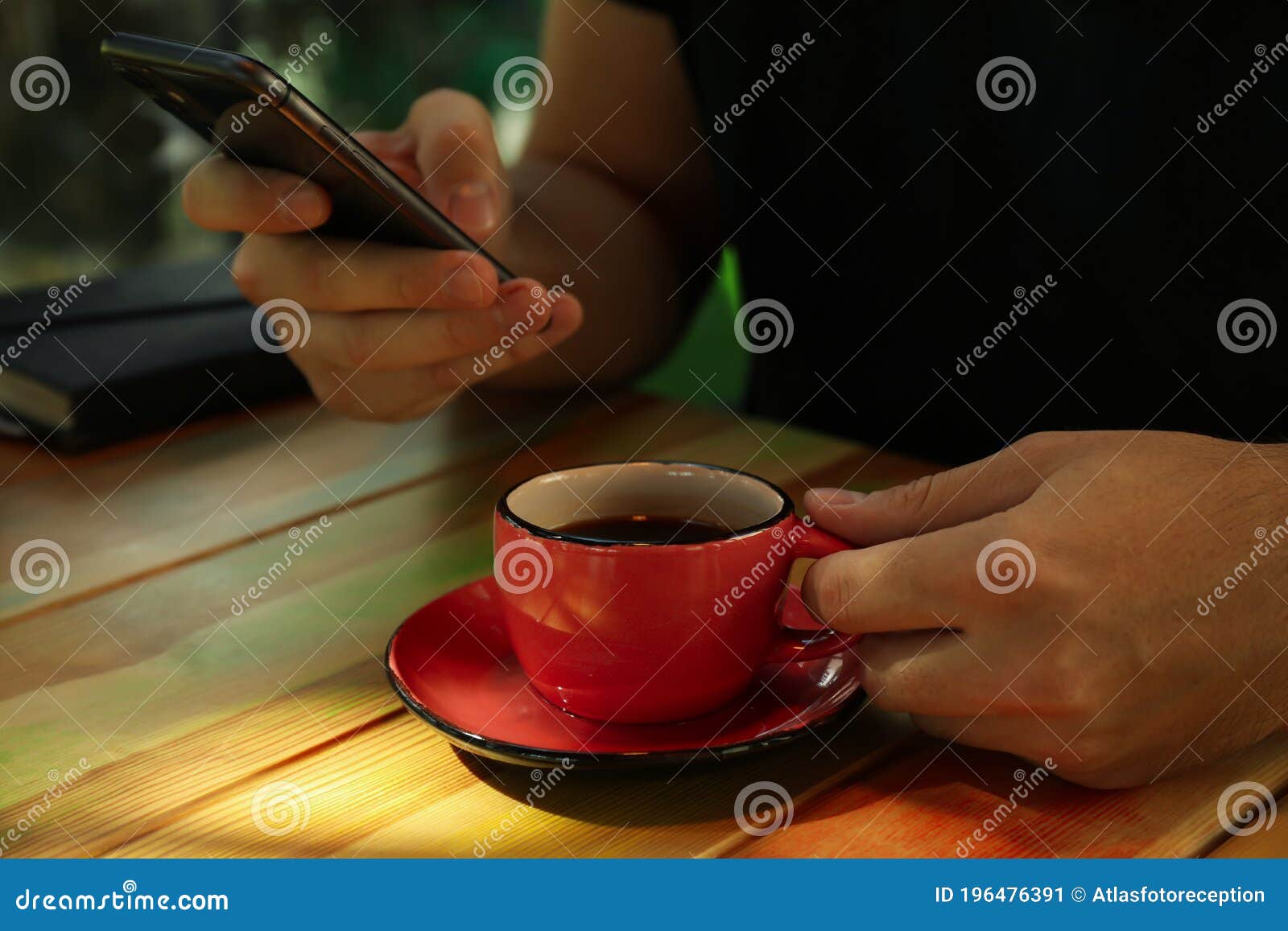 Man Using Phone and Drink Coffee in Restaurant Stock Image - Image of ...