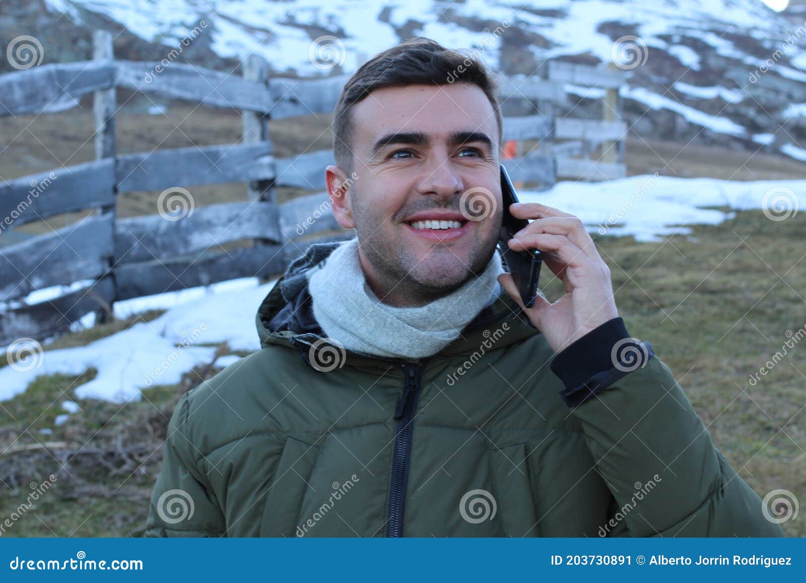 Man using phone in nature stock image. Image of holding - 203730891