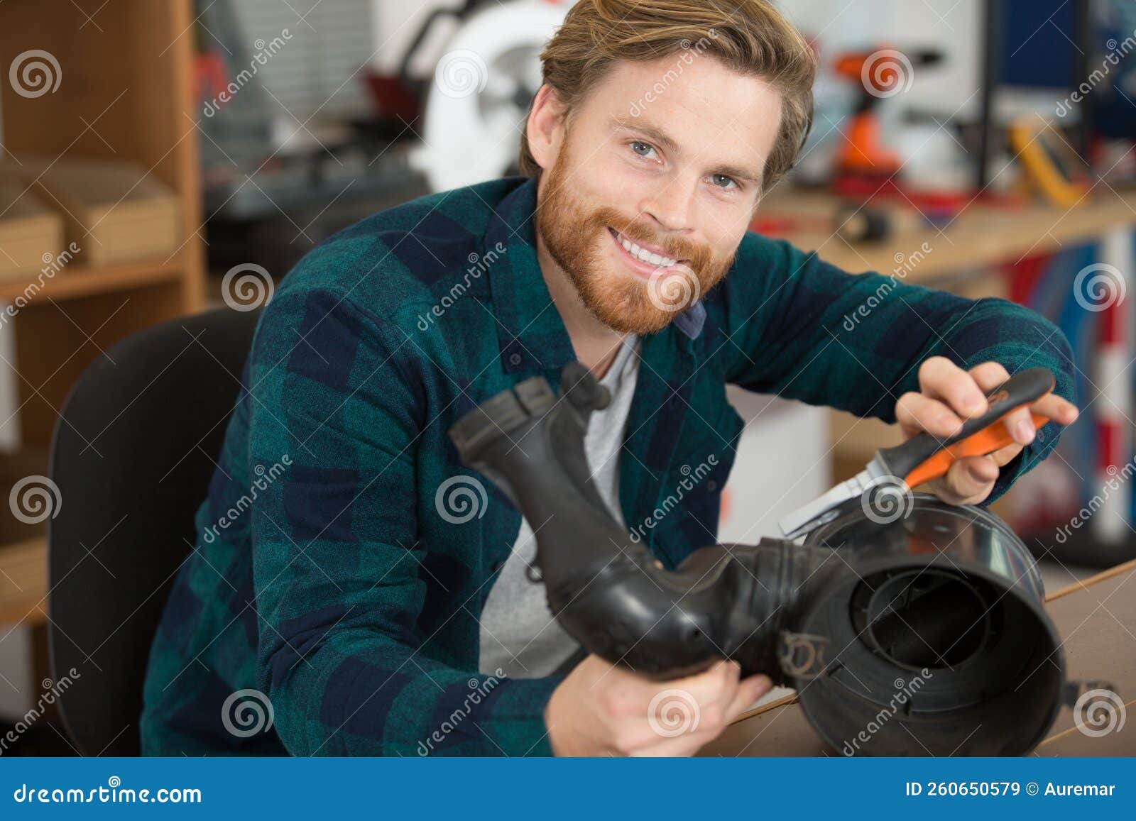 Man Using Pipe Wrench Smiling at Camera Stock Image - Image of tool ...