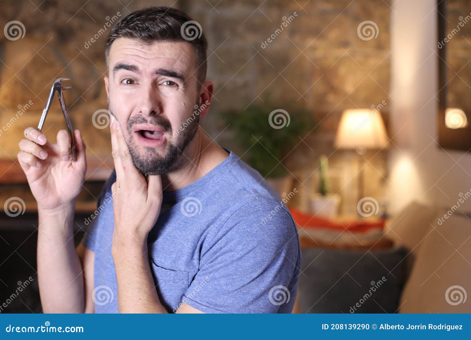 Man Using Pliers To Remove Tooth Stock Photo - Image of hygiene ...