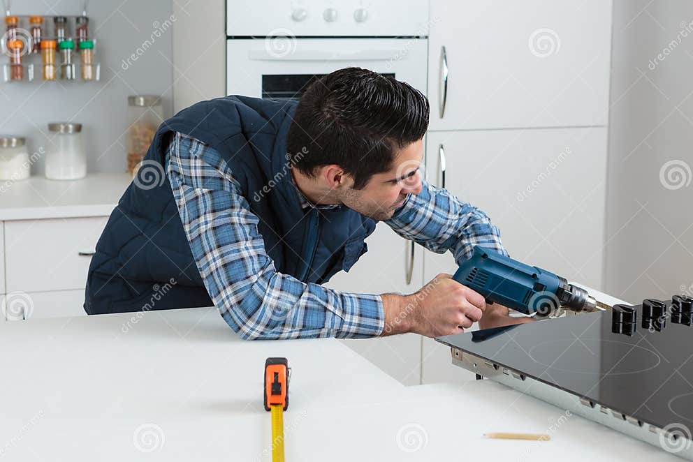 Man Using Power Tool in Residential Setting Stock Image - Image of ...