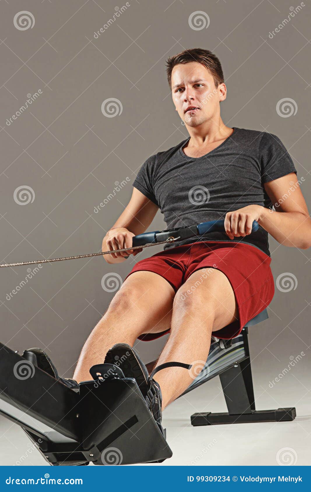 Man Using a Press Machine in a Fitness Club. Stock Photo - Image of ...