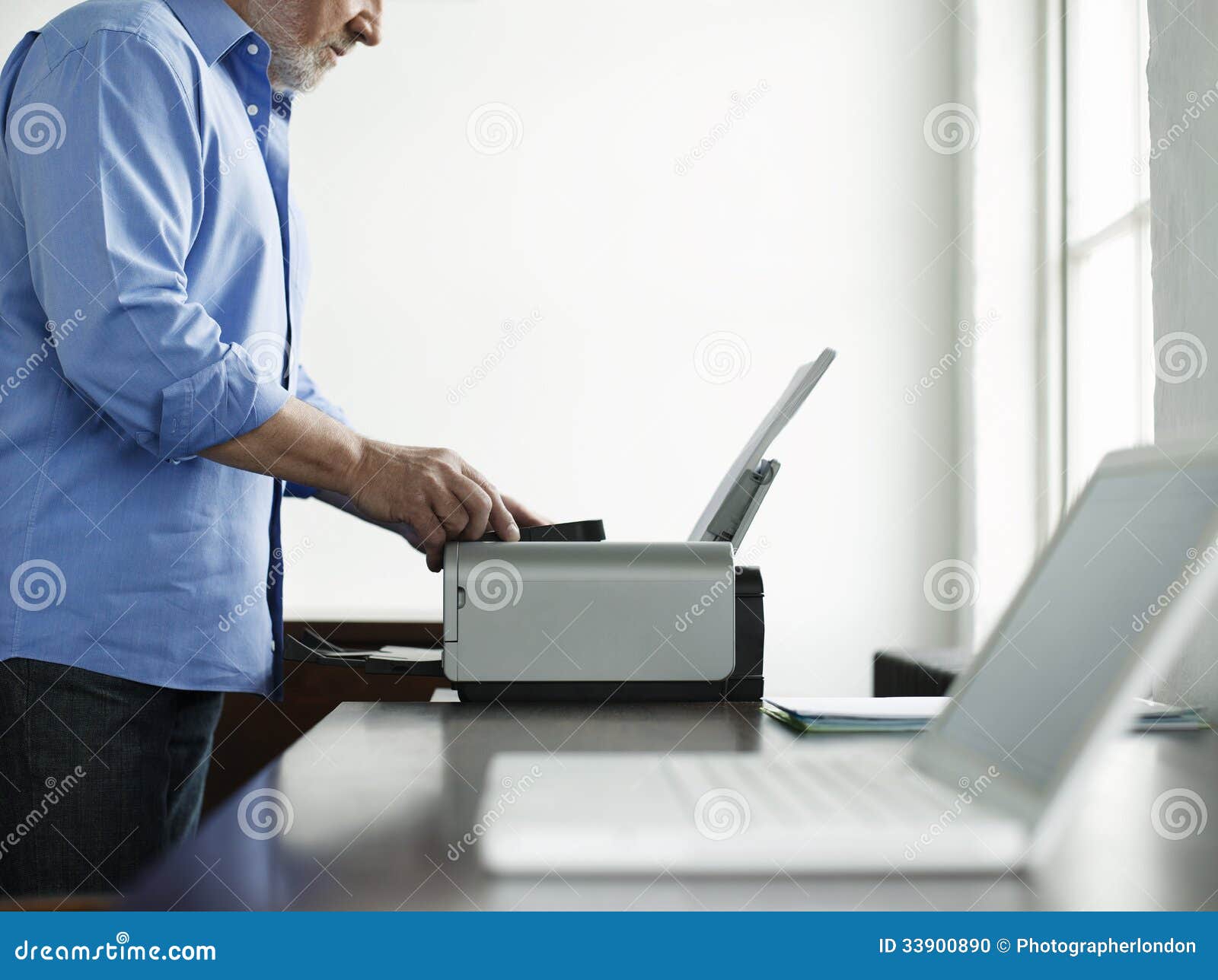Man Using Printer at Study Table in House Stock Photo - Image of people ...