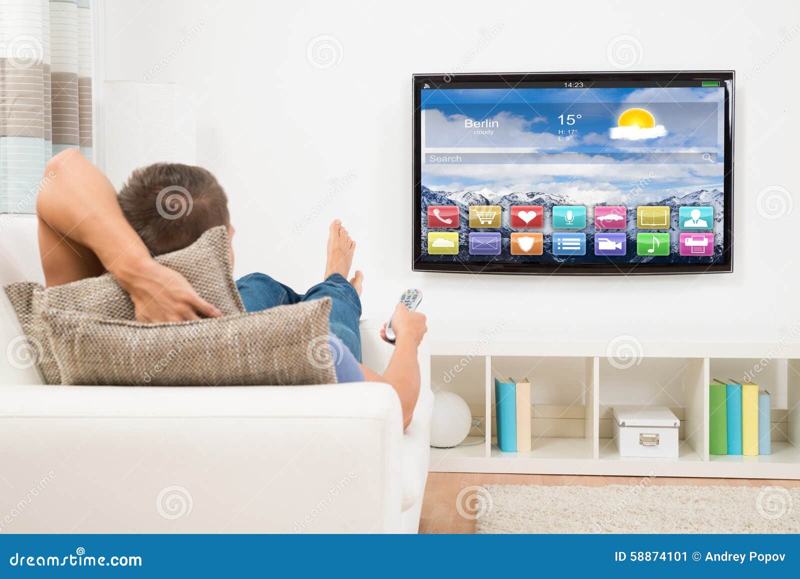 Man Using Remote Control in Front of Television Stock Image - Image of ...