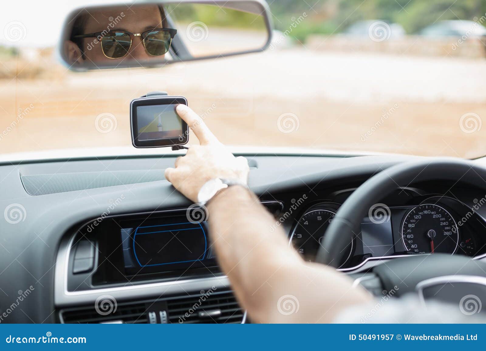 Man Using Satellite Navigation System Stock Image - Image of automobile ...