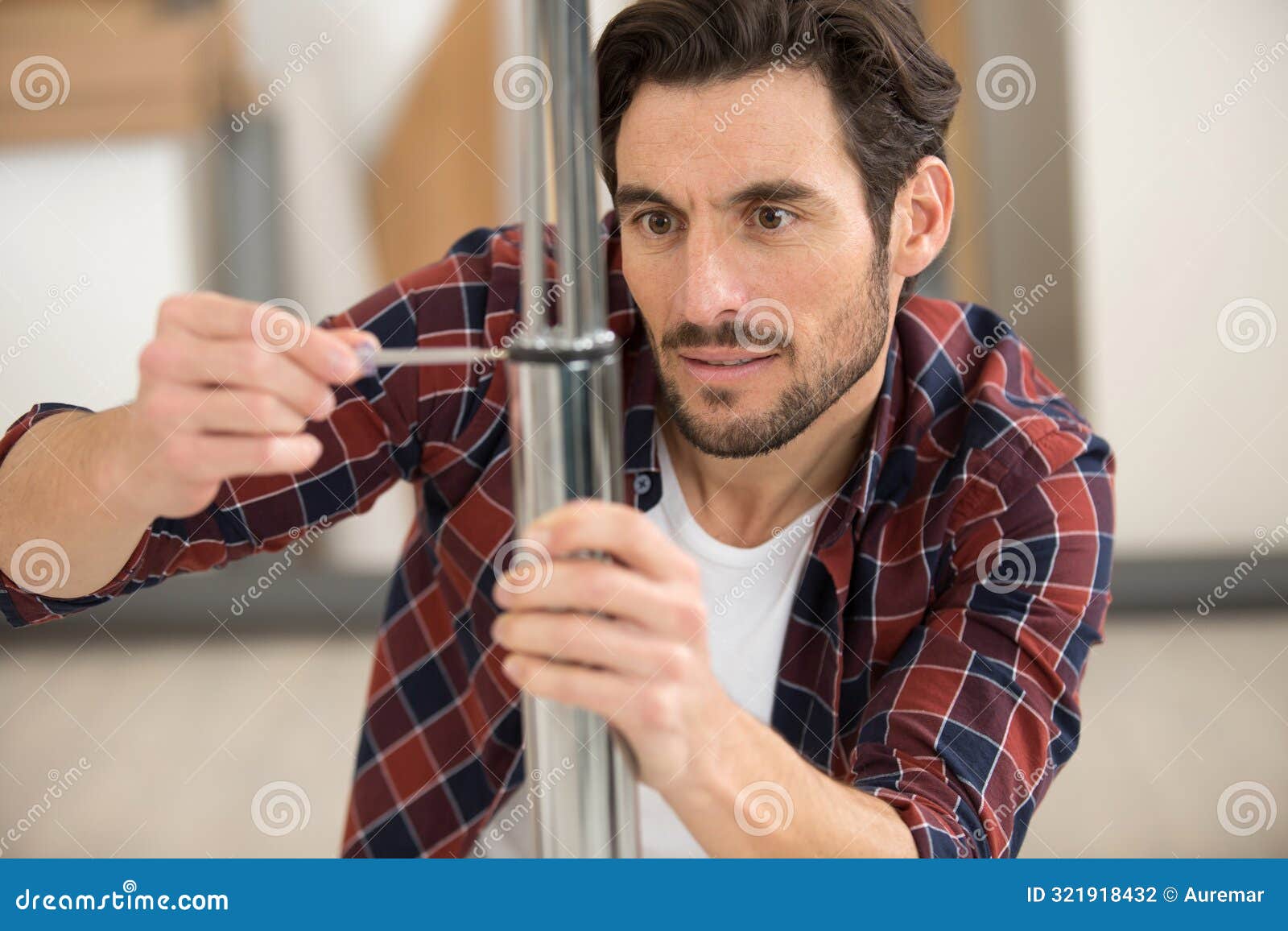 Man Using Screwdriver To Locate Rubber Seal into Groove Stock Photo ...