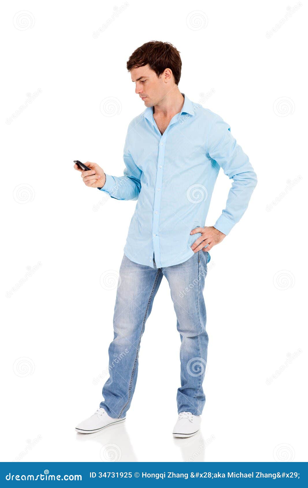 Man using smart phone stock image. Image of looking, phone - 34731925