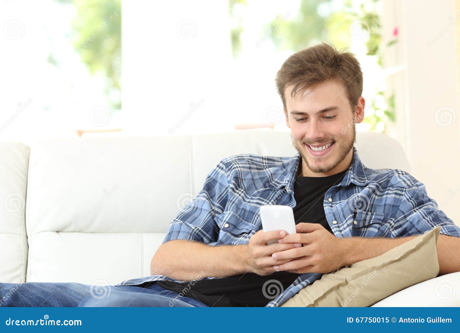 Man Using a Smart Phone at Home Stock Image - Image of internet ...