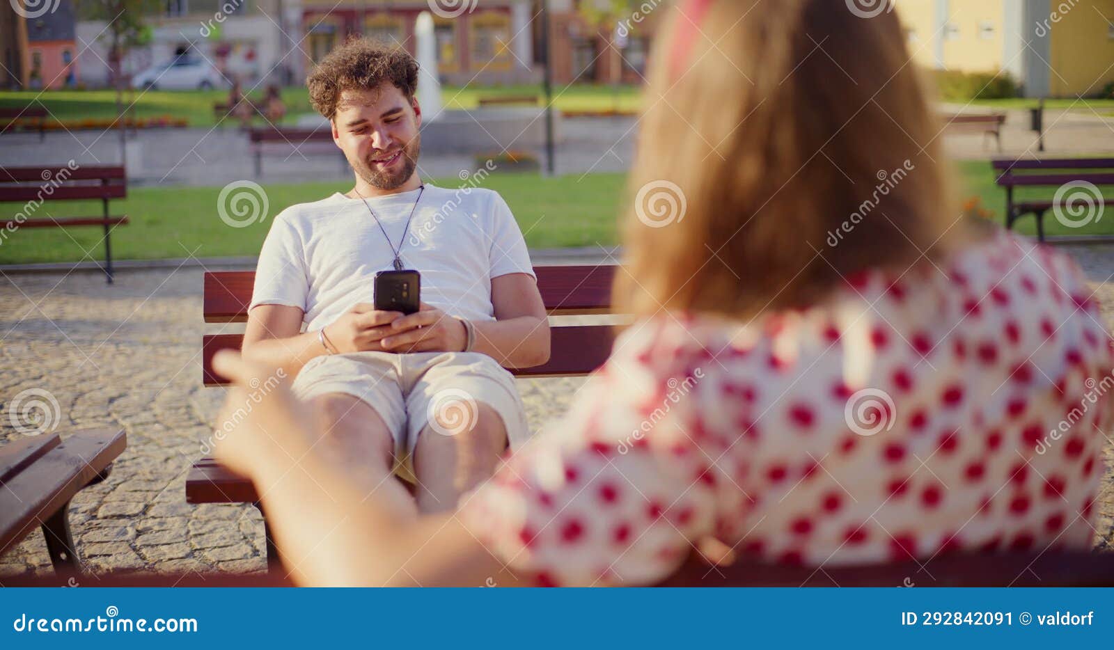 Man Using Smart Phone and Talking with Girlfriend Stock Video - Video ...