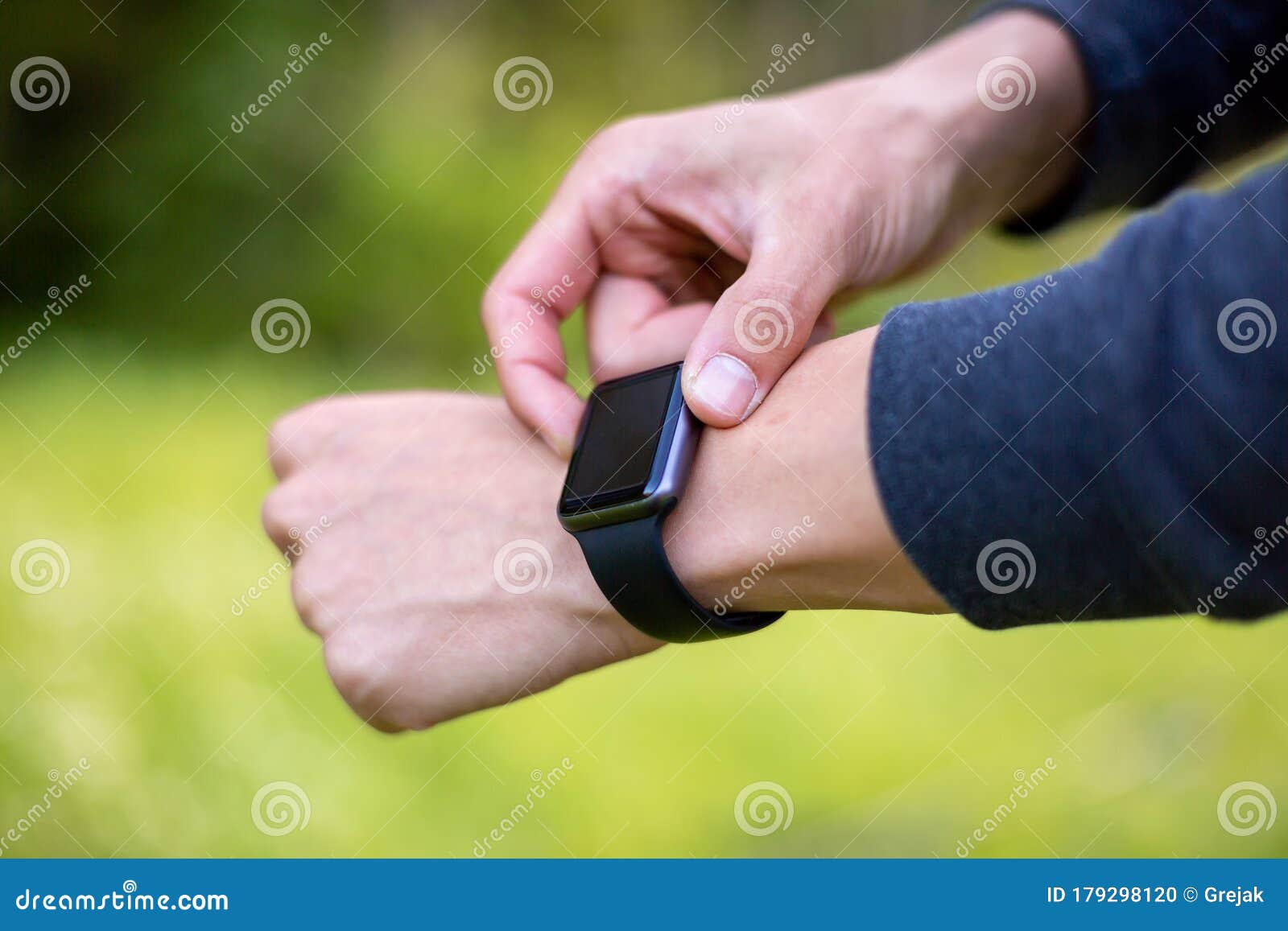 Man using smart watch stock photo. Image of smart, digital - 179298120