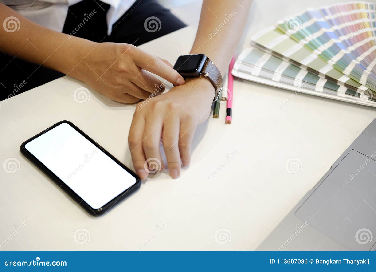 Man Using a Smart Watch at Desk in Office. Stock Photo - Image of ...