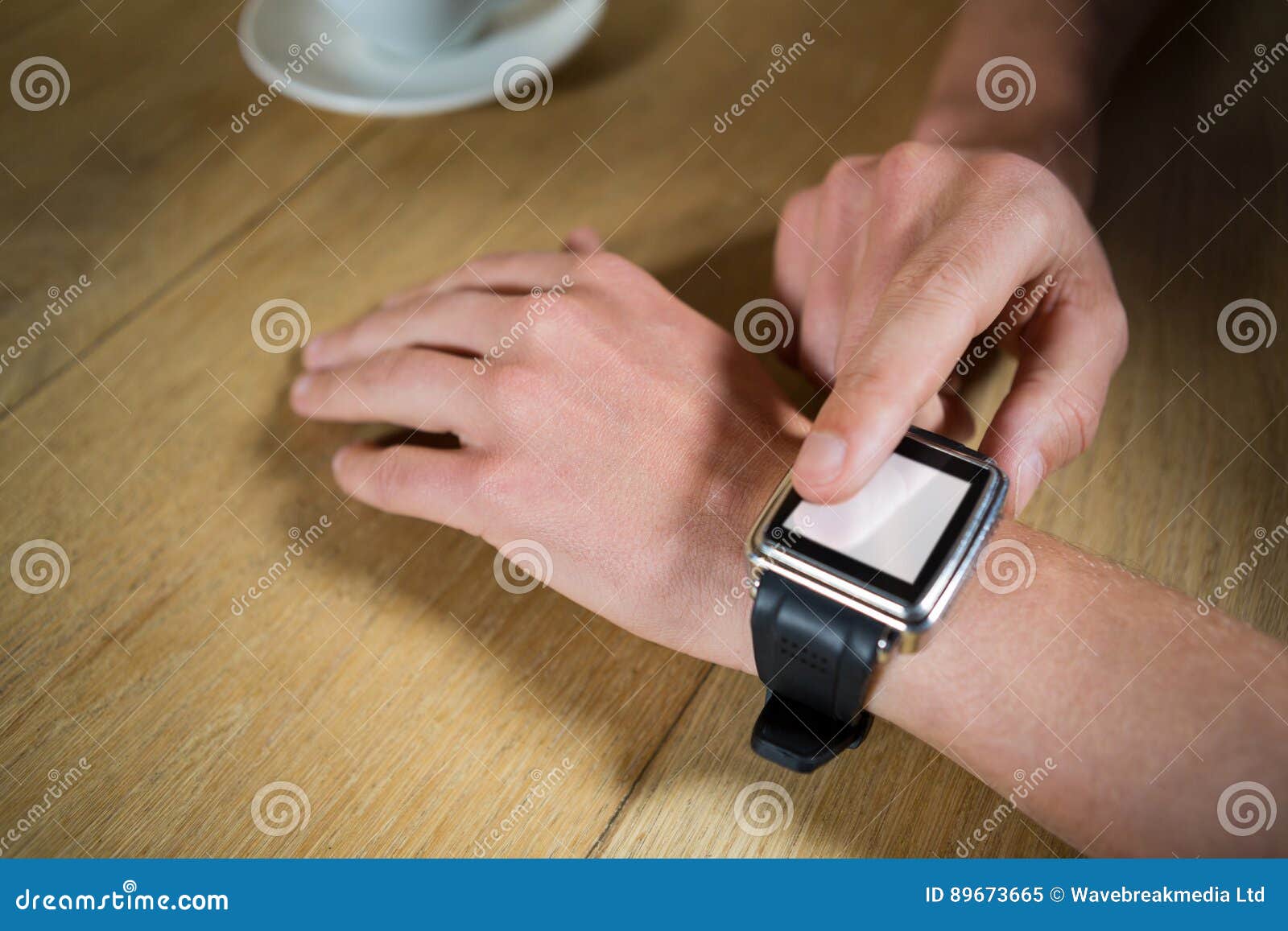 Man Using Smart Watch at Table in Coffee Shop Stock Image - Image of ...