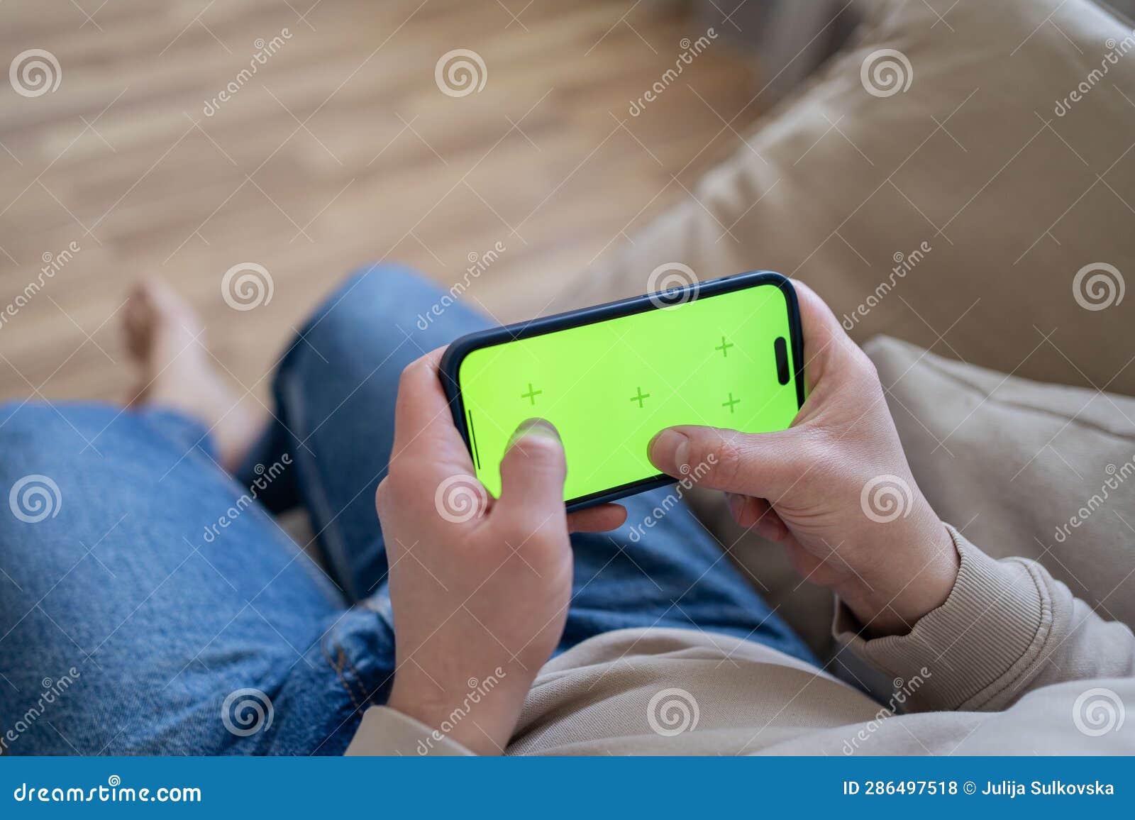 Man Using Smartphone with Chroma Key Screen at Home. Stock Photo ...
