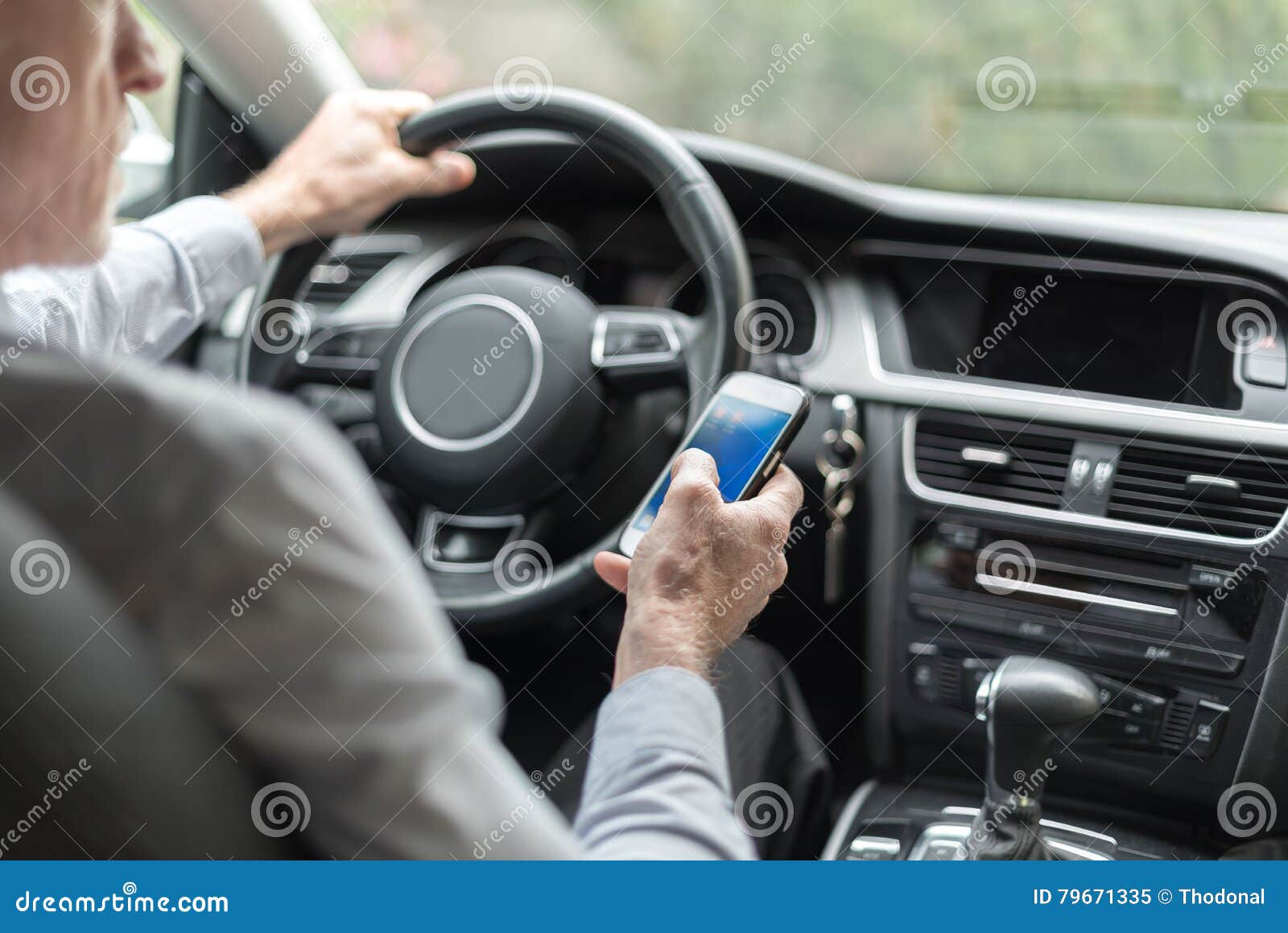 Man Using a Smartphone and Driving Stock Image - Image of safety ...