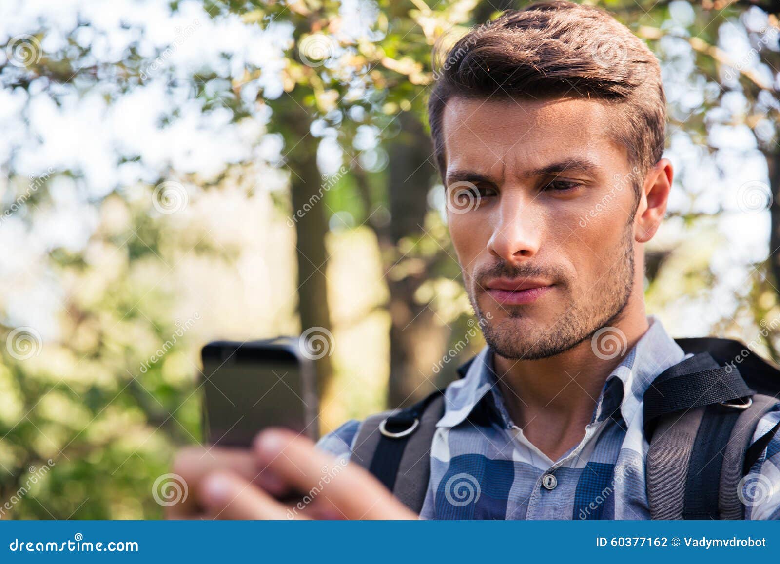 Man Using Smartphone in the Forest Stock Photo - Image of connection ...