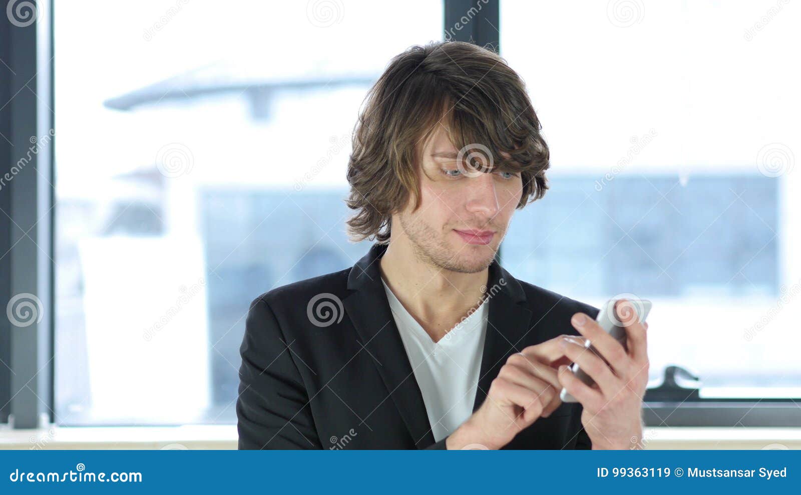 Man Using Smartphone in His Office Stock Image - Image of portrait ...