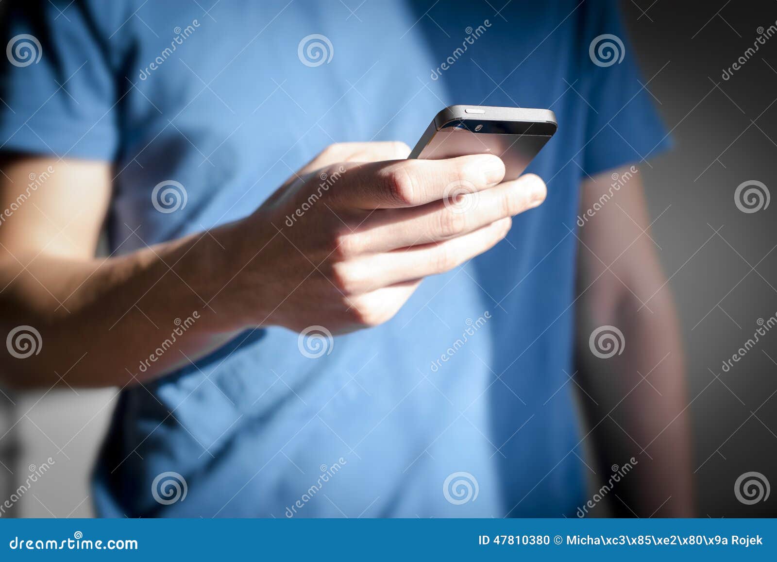 Man using smartphone. stock photo. Image of passeig, messenger - 47810380