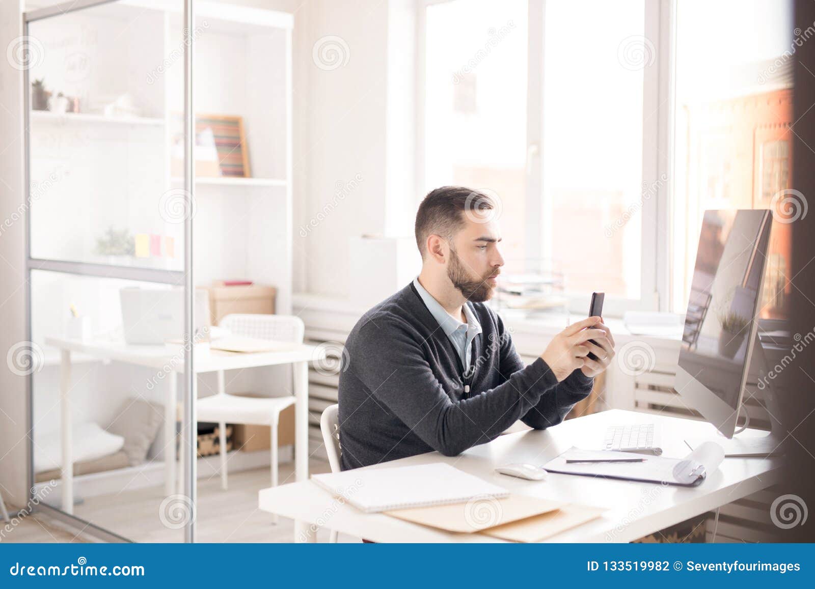 Man Using Smartphone at Work Stock Photo - Image of finance, computer ...