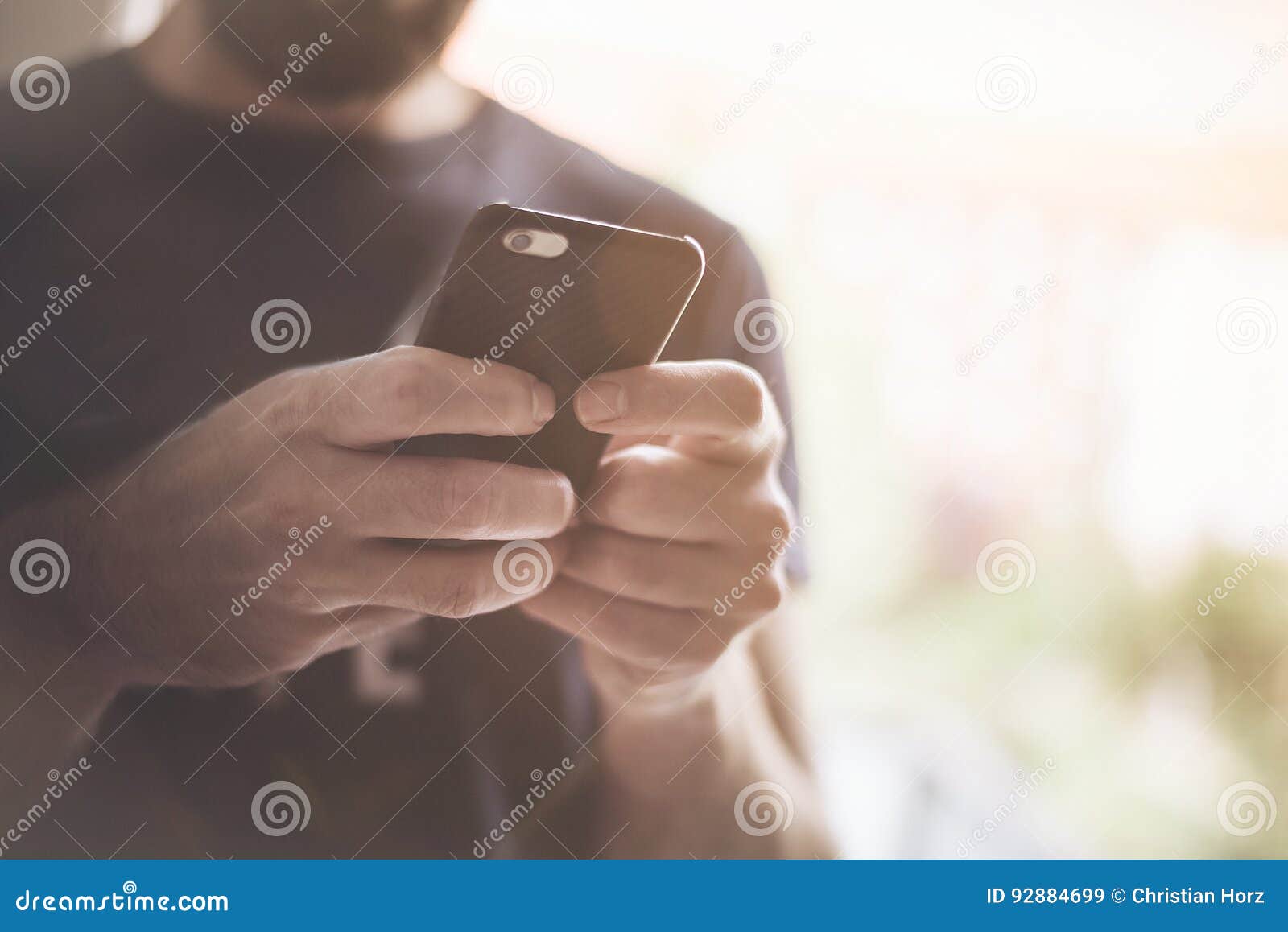 Man using smartphone stock image. Image of freelance - 92884699
