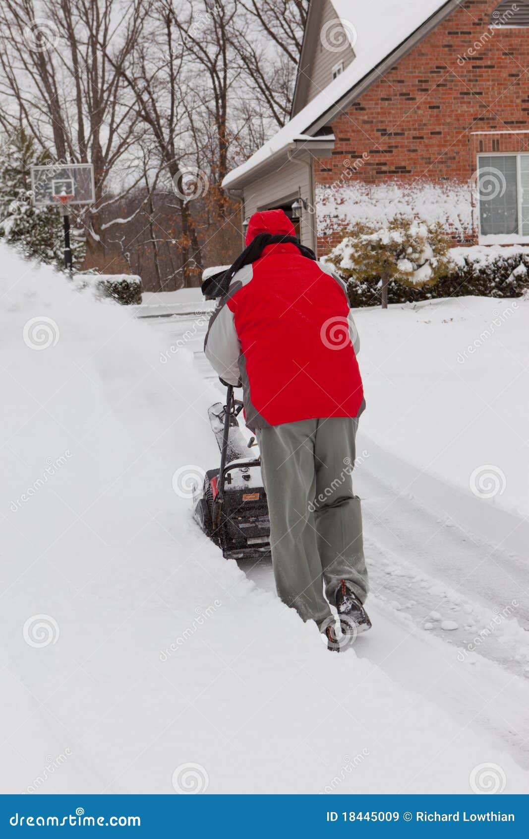 Man Using a Snow Blower editorial stock image. Image of jacket - 18445009