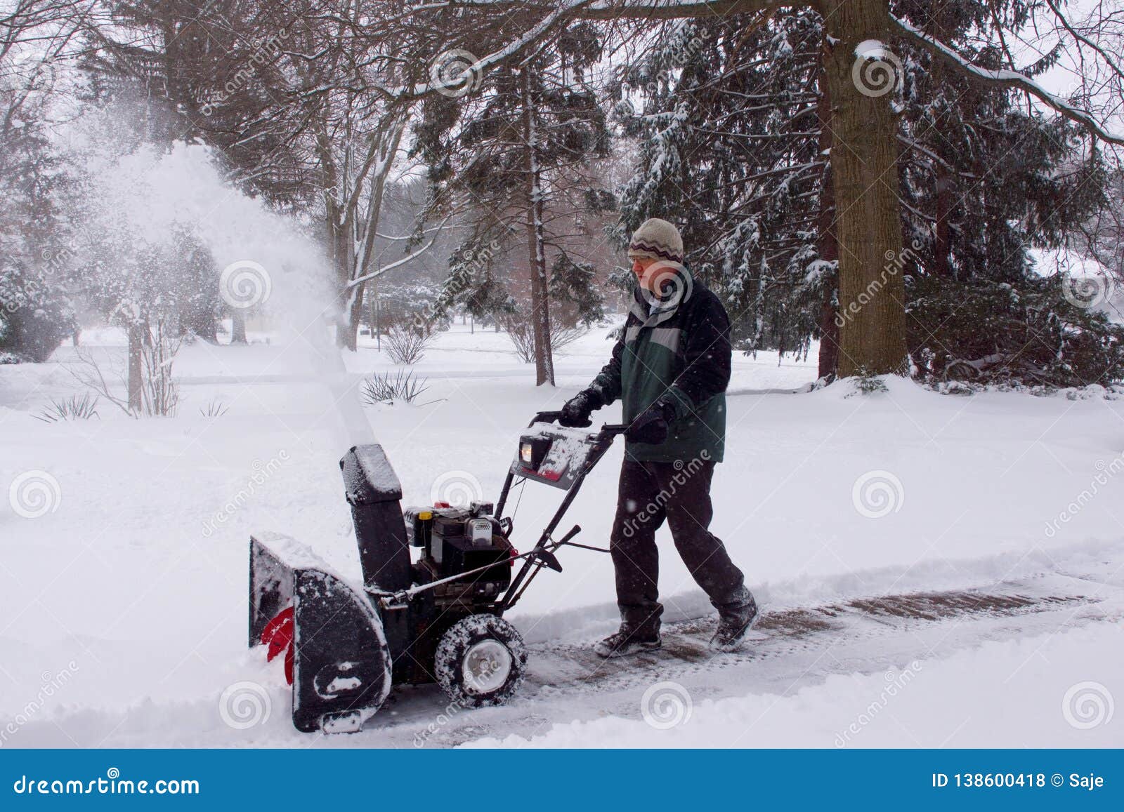 Snowblower Man Blowing Snow Away from Viewer Stock Photo - Image of ...