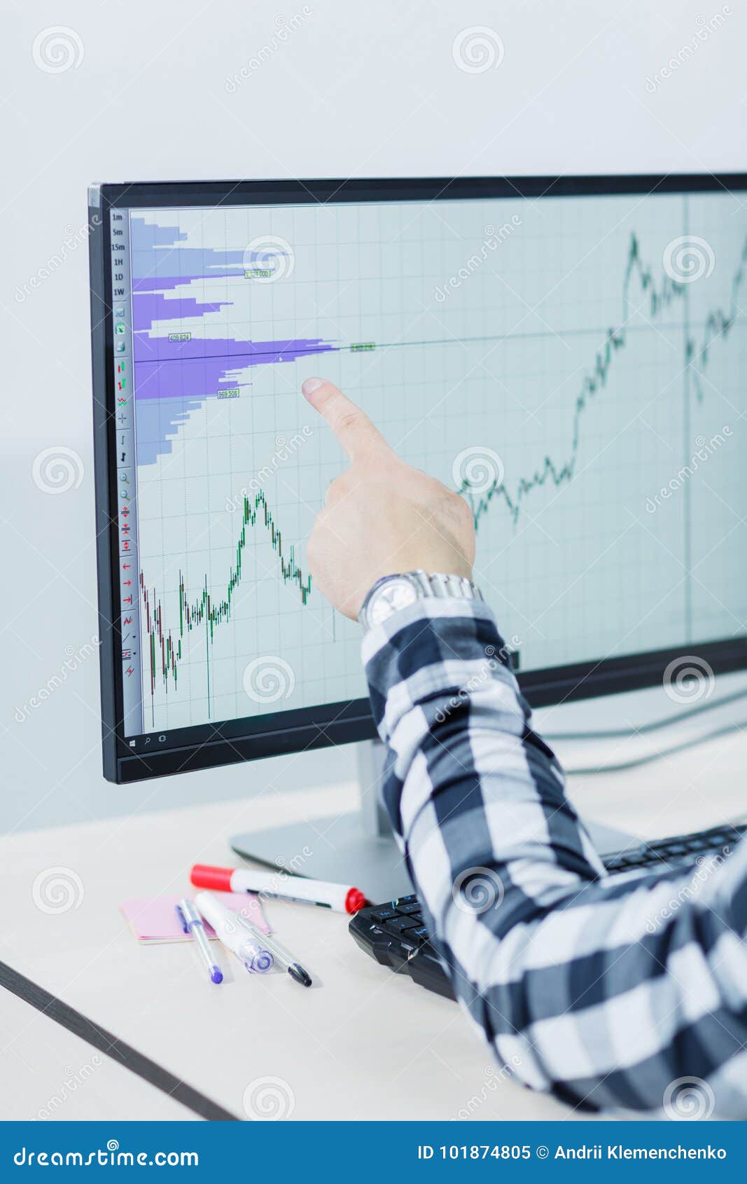 A Man Using Software To Manage Projects on a Laptop Computer Stock ...