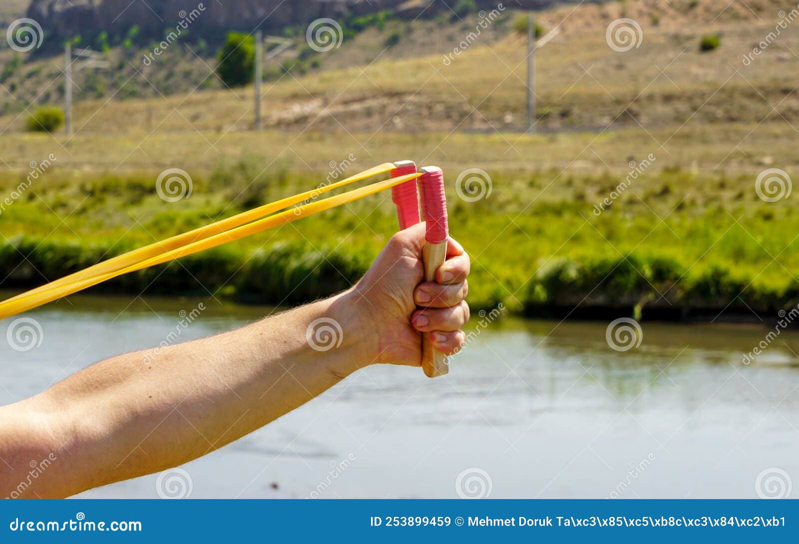 Man Using Spear Thrower Throwing Rock Nature Amusement Stock Image ...