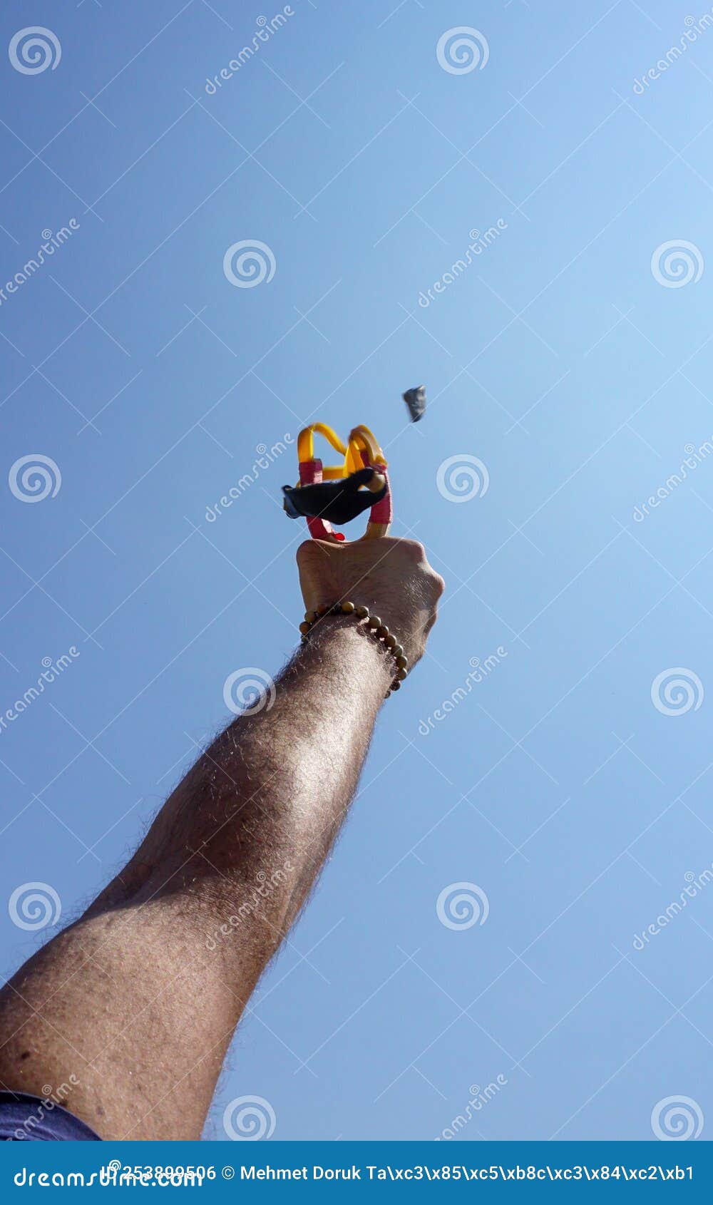Man Using Spear Thrower Throwing Rock Nature Amusement Stock Photo ...