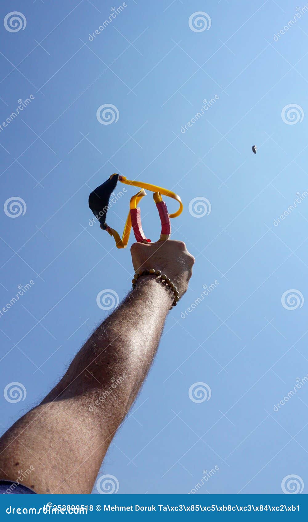 Man Using Spear Thrower Throwing Rock Nature Amusement Stock Photo ...