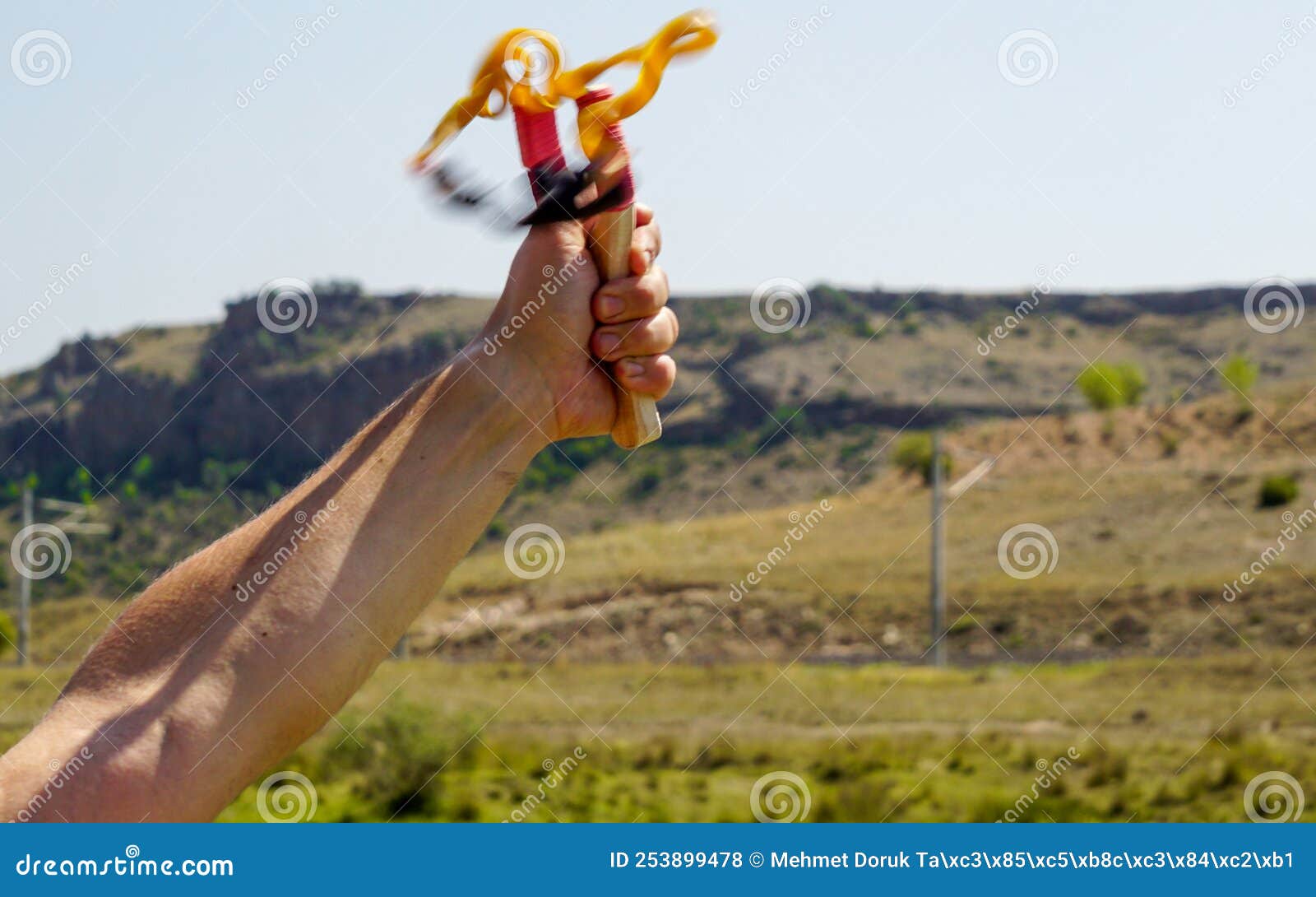 Man Using Spear Thrower Throwing Rock Nature Amusement Stock Photo ...
