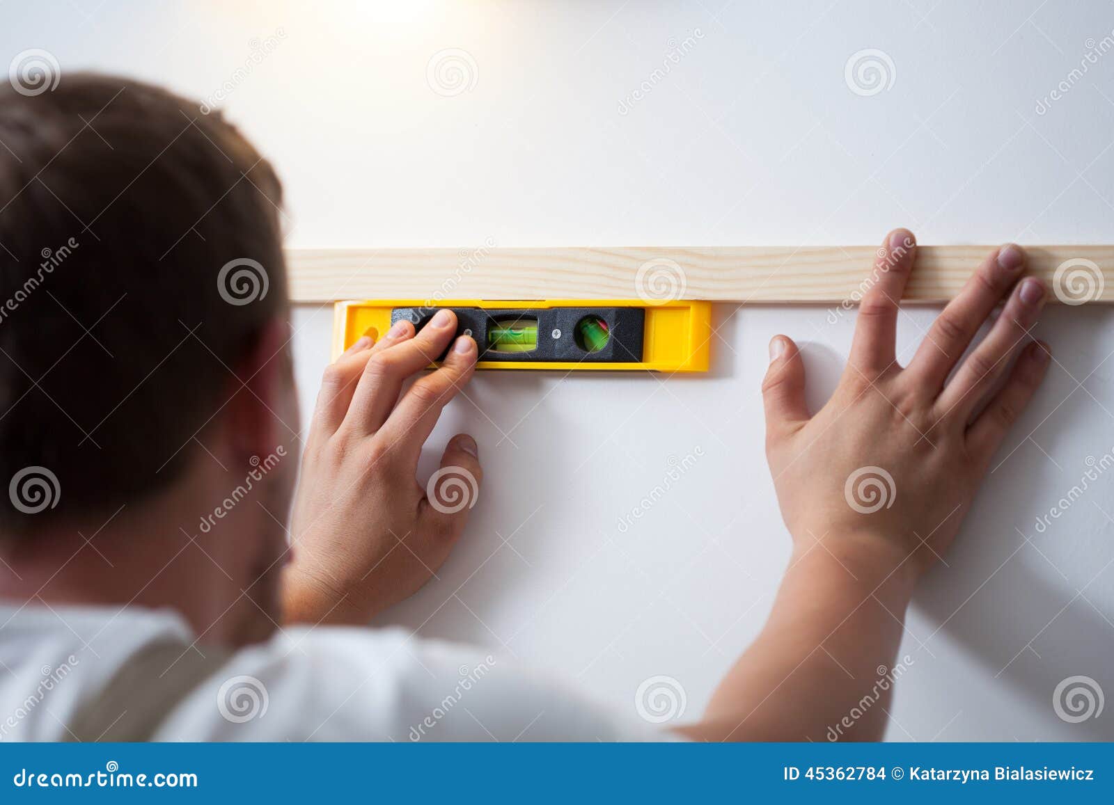 Man Using Spirit Level at Home Stock Photo - Image of close, equipment ...