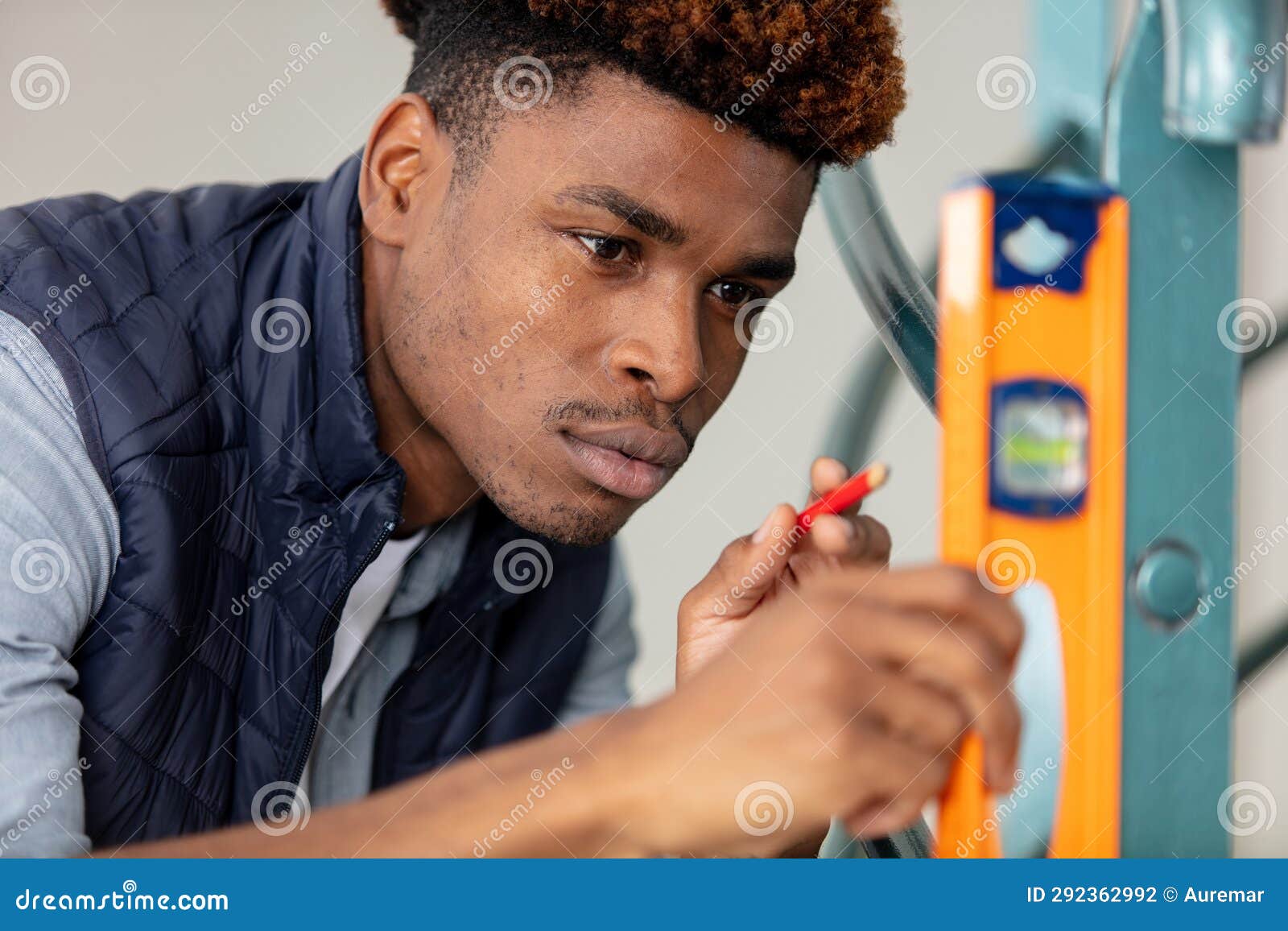 Man Using Spirit Level To Check Surface Stock Photo - Image of ...