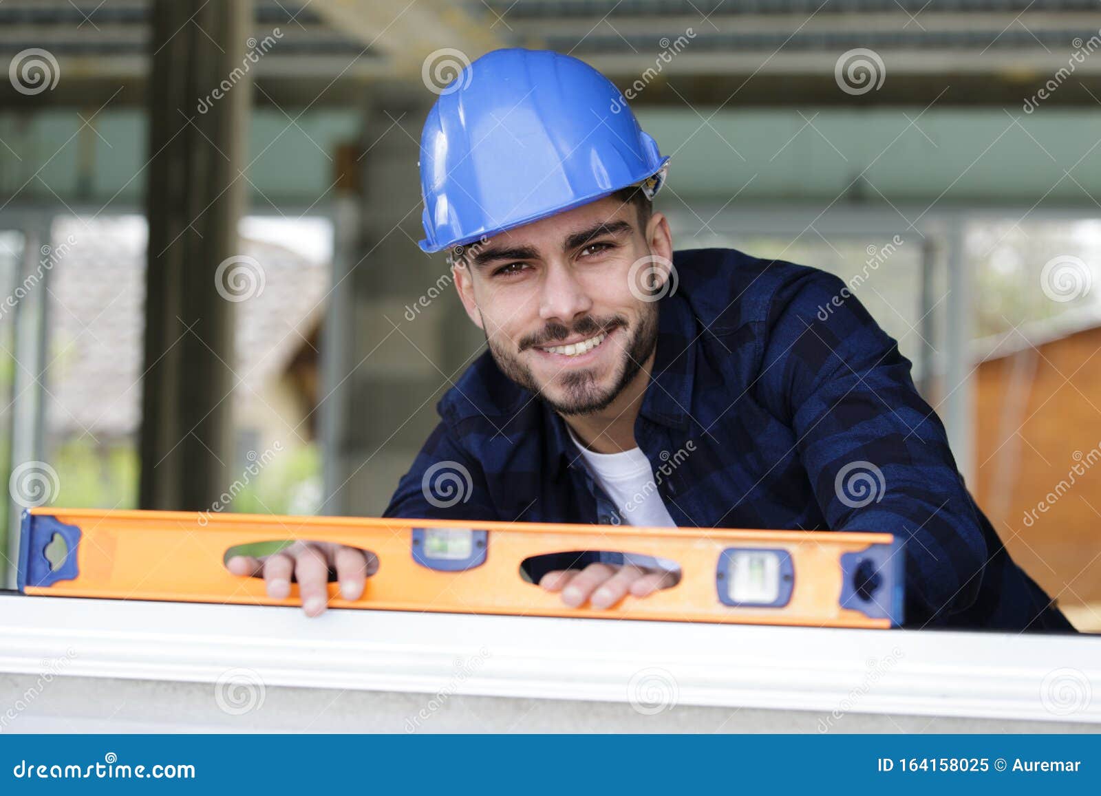 Man Using Spirit Level To Plumb Wall Stock Image - Image of level ...