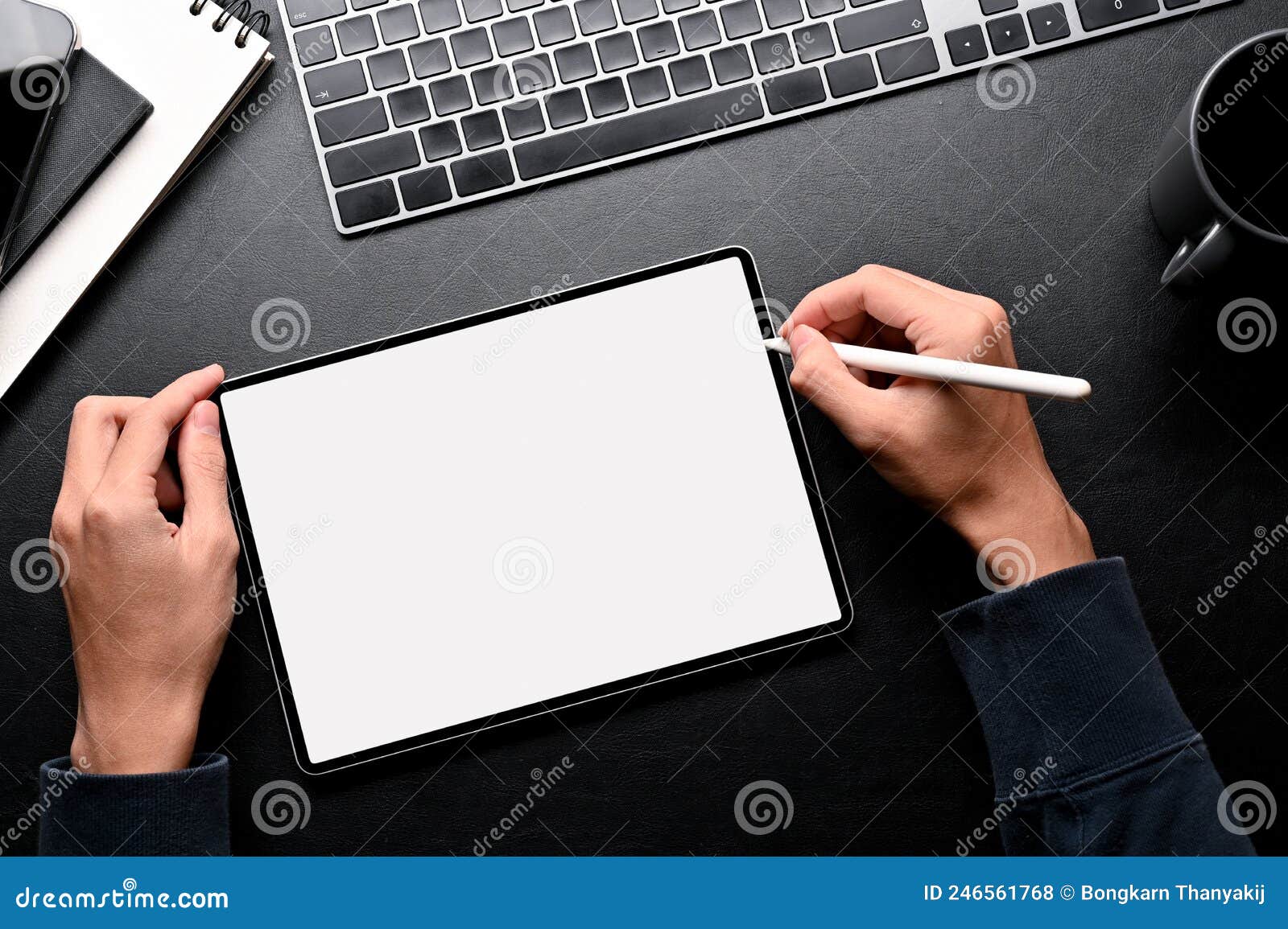 A Man Using Stylus Pen, Drawing on Digital Tablet on a Modern Stylish ...