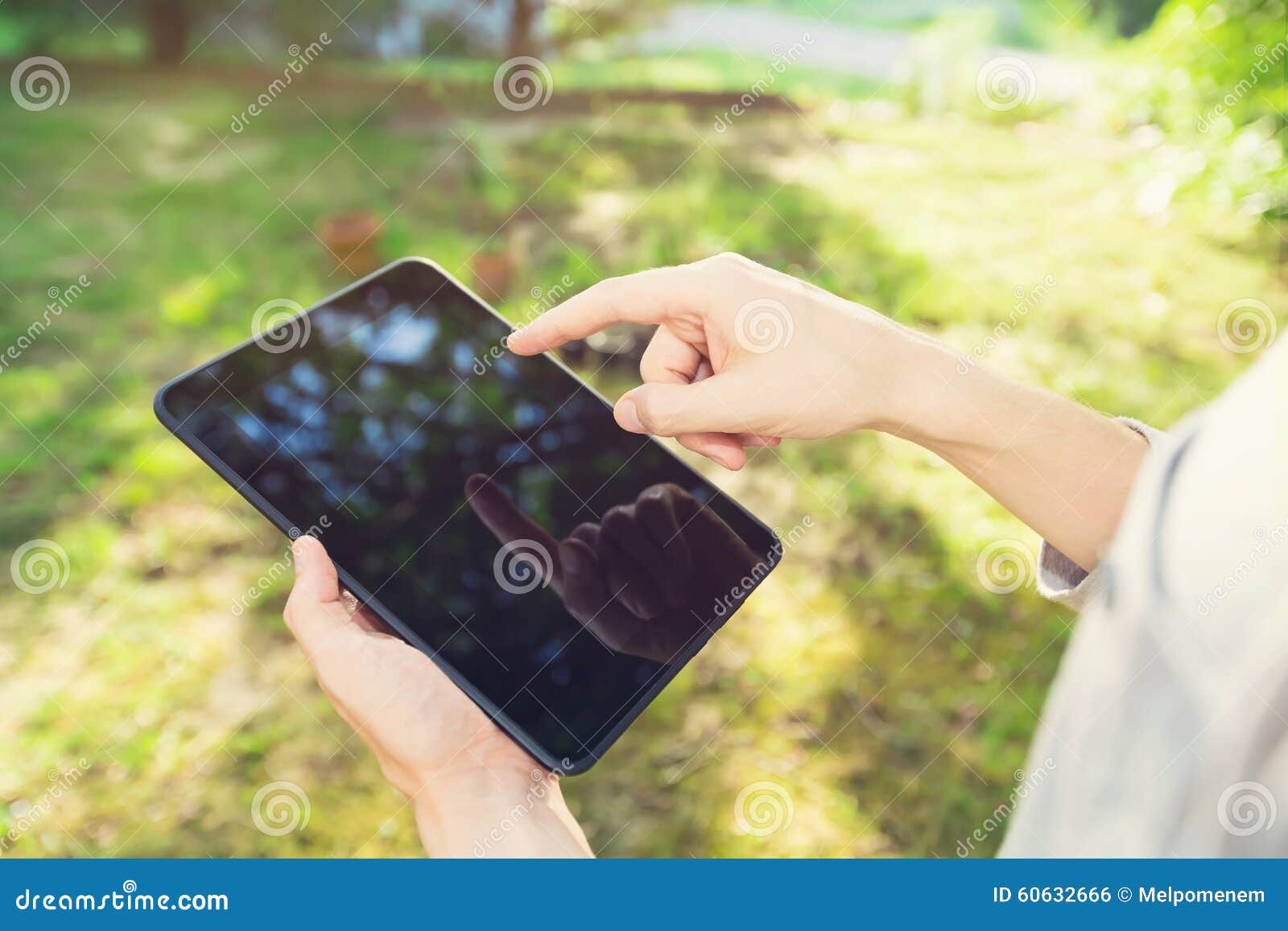 Man Using a Tablet Computer Outside Stock Photo - Image of outdoors ...