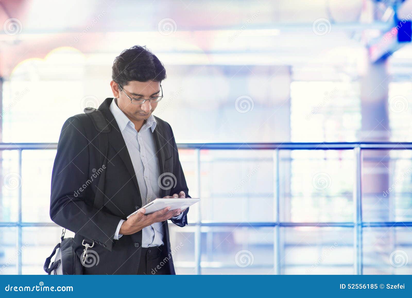 Man Using Tablet Computer at Train Station Stock Image - Image of ...