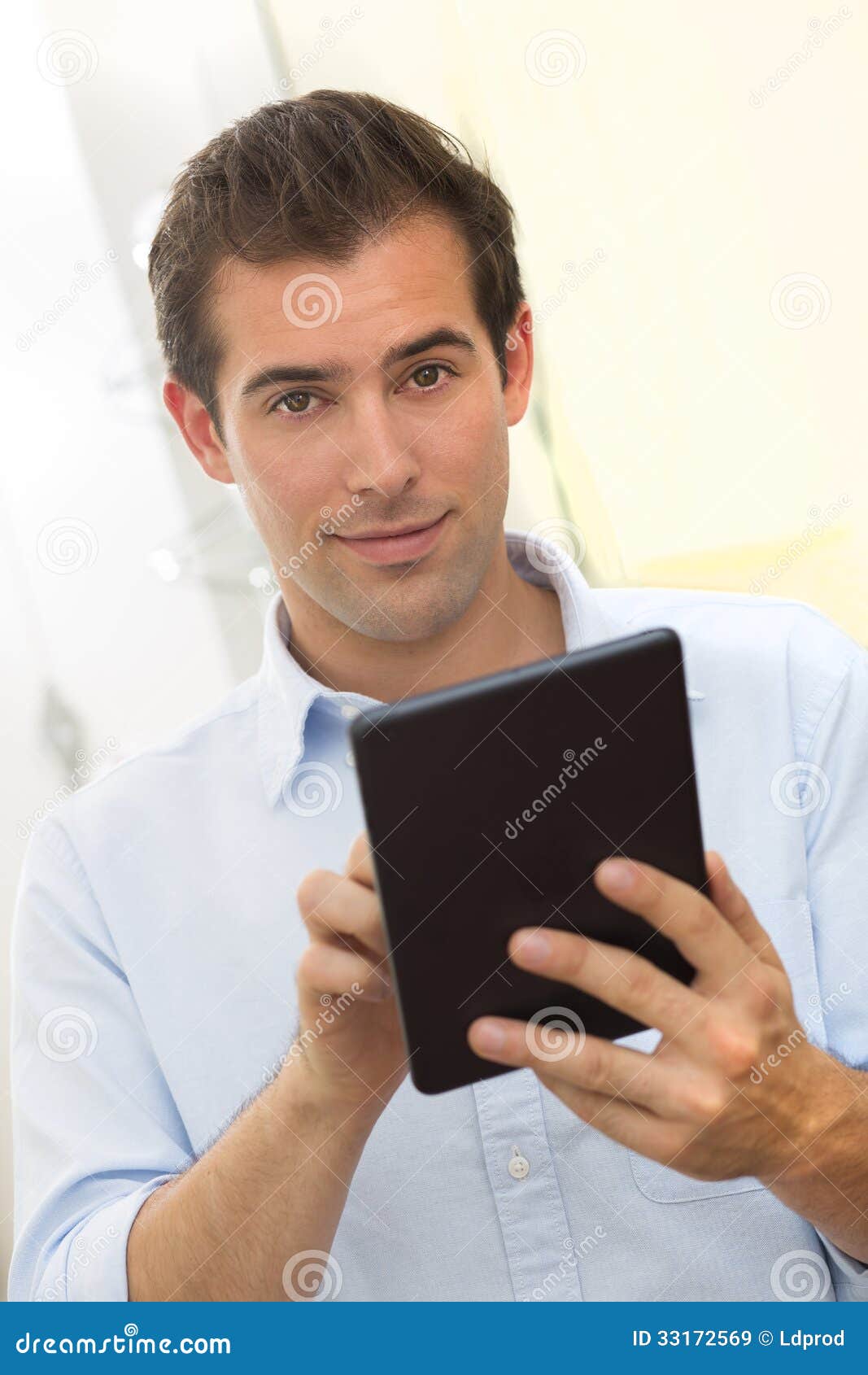 Man using tablet pc indoor stock image. Image of looking - 33172569