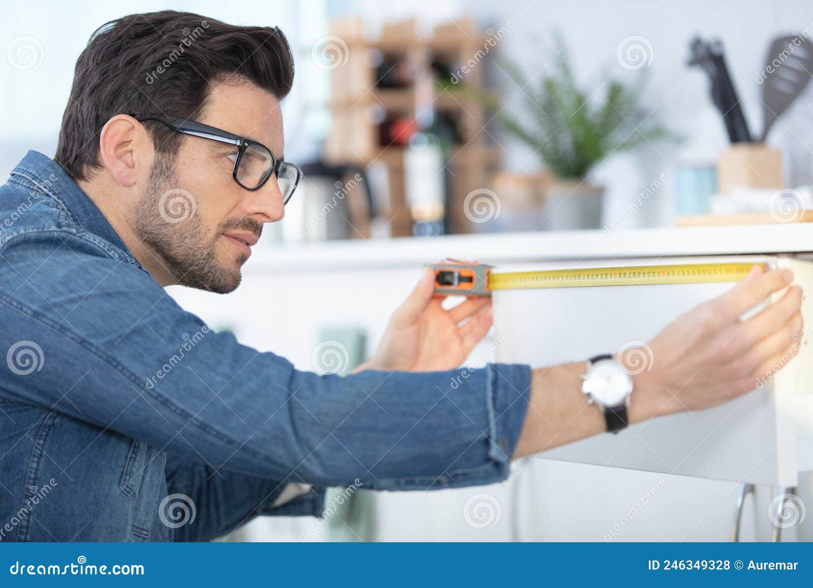 Man Using Tape Measure for Measuring Dimension Product Stock Photo ...