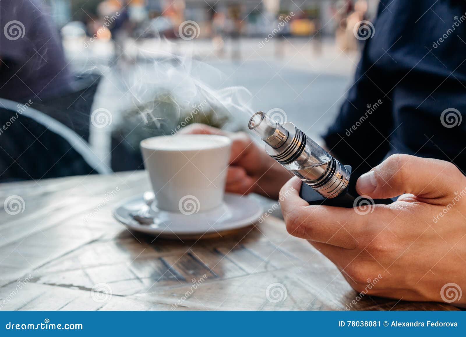 Man Using Vape or Electronic Cigarette and Drinking Coffee Stock Image ...