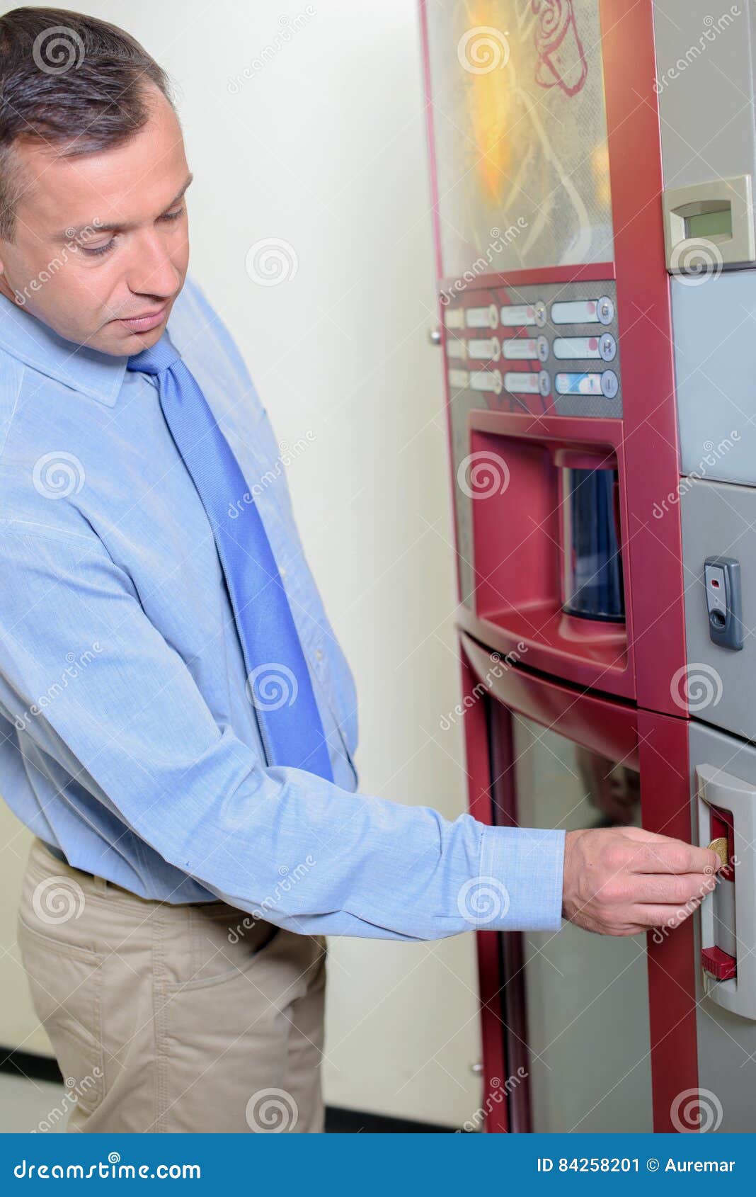 Man using vending machine stock image. Image of vending - 84258201