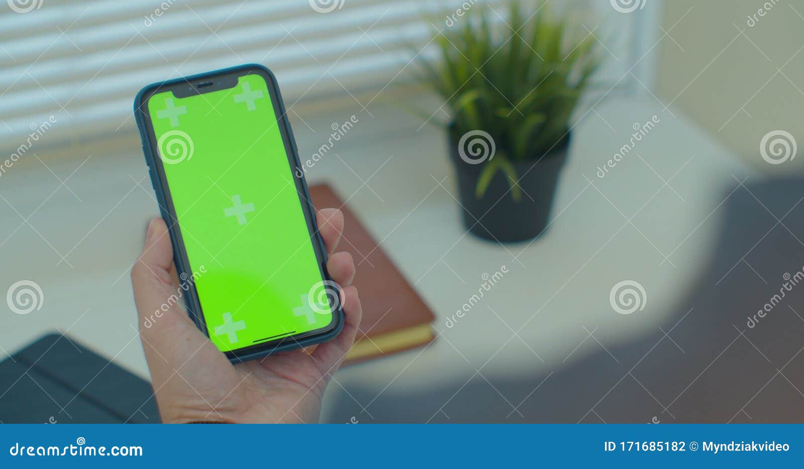 Man Using Vertical Smartphone with Green Screen. Close-up Shot of Man`s ...
